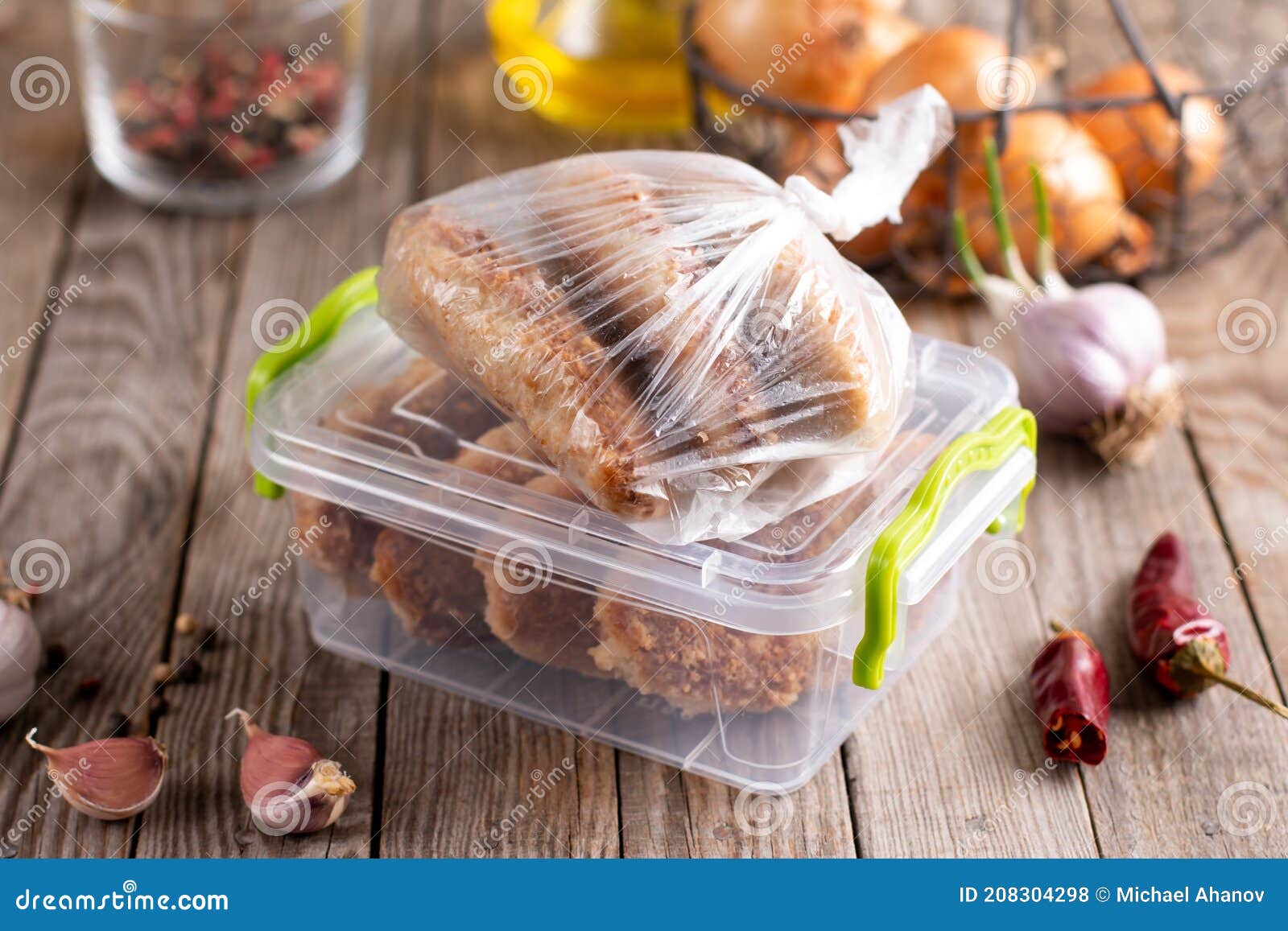 Frozen Cutlets in a Container and Bag. Ready Frozen Food Stock Photo ...