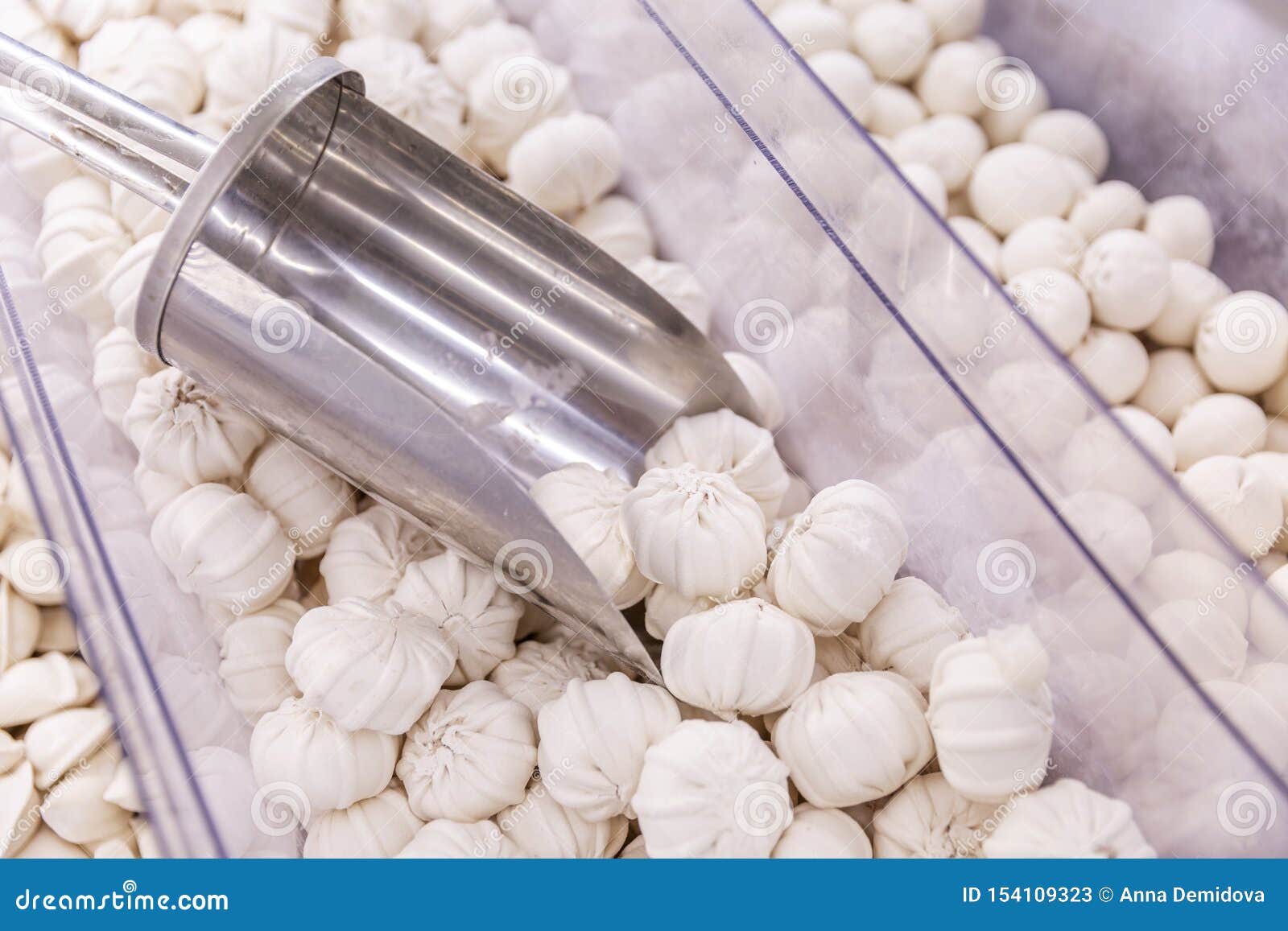 Frozen Dumplings in the Supermarket Fridge, Close-up. Stock Image ...