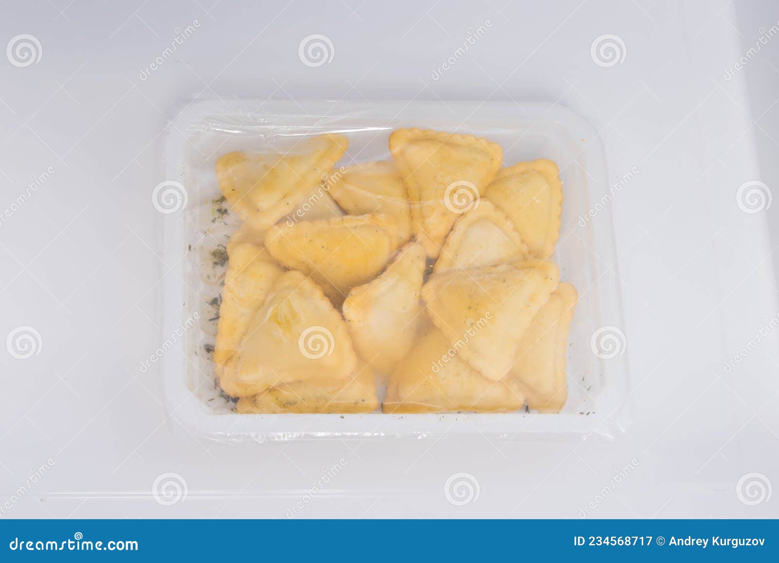 Frozen Fast Food for Deep-frying in Vacuum Packaging, Triangles with ...