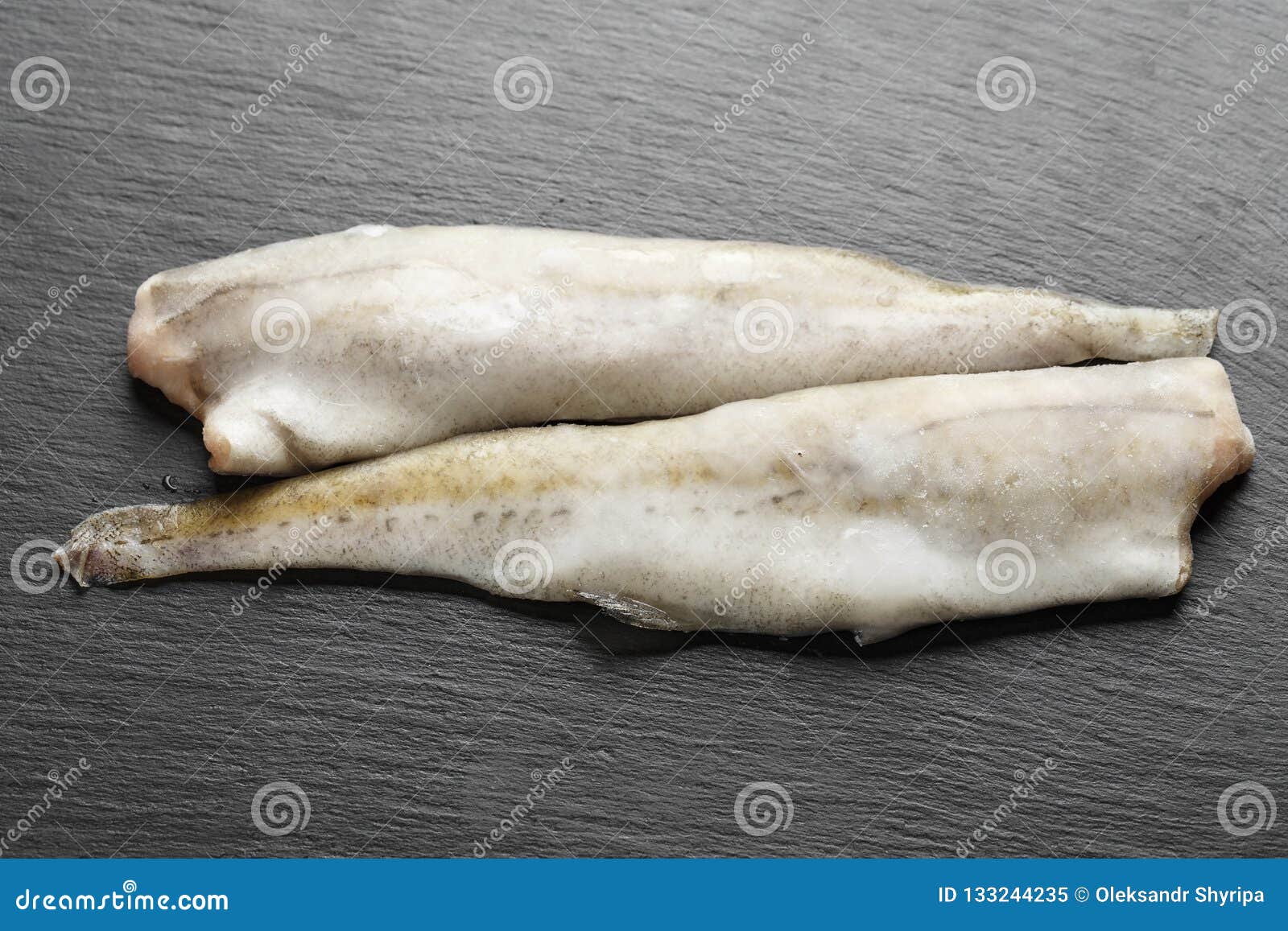 Two fish hake in ice stock image. Image of food, protein - 133244235