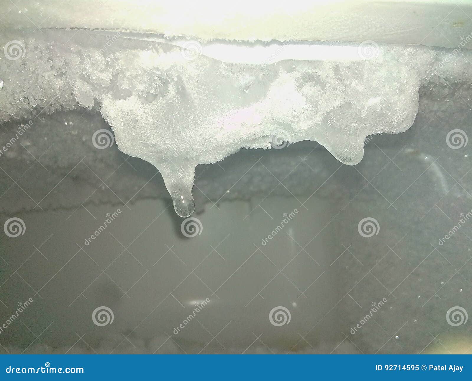 Frozen ice drop in fridge stock image. Image of water - 92714595