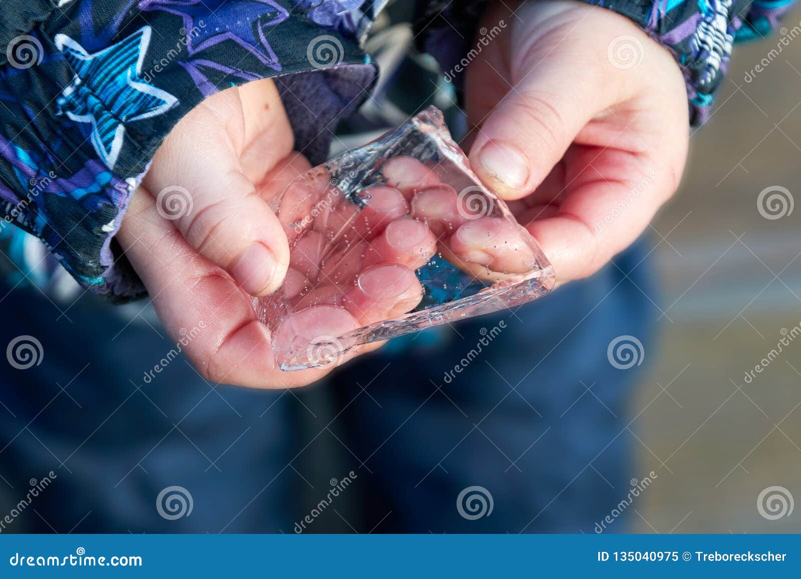 Frozen Ice in the Hands of a Child Stock Image - Image of close, cold ...