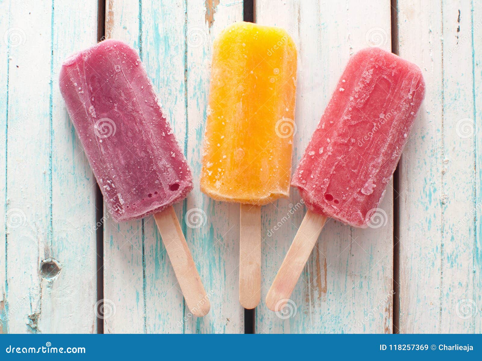 Frozen ice popsicles stock image. Image of wood, treat - 118257369
