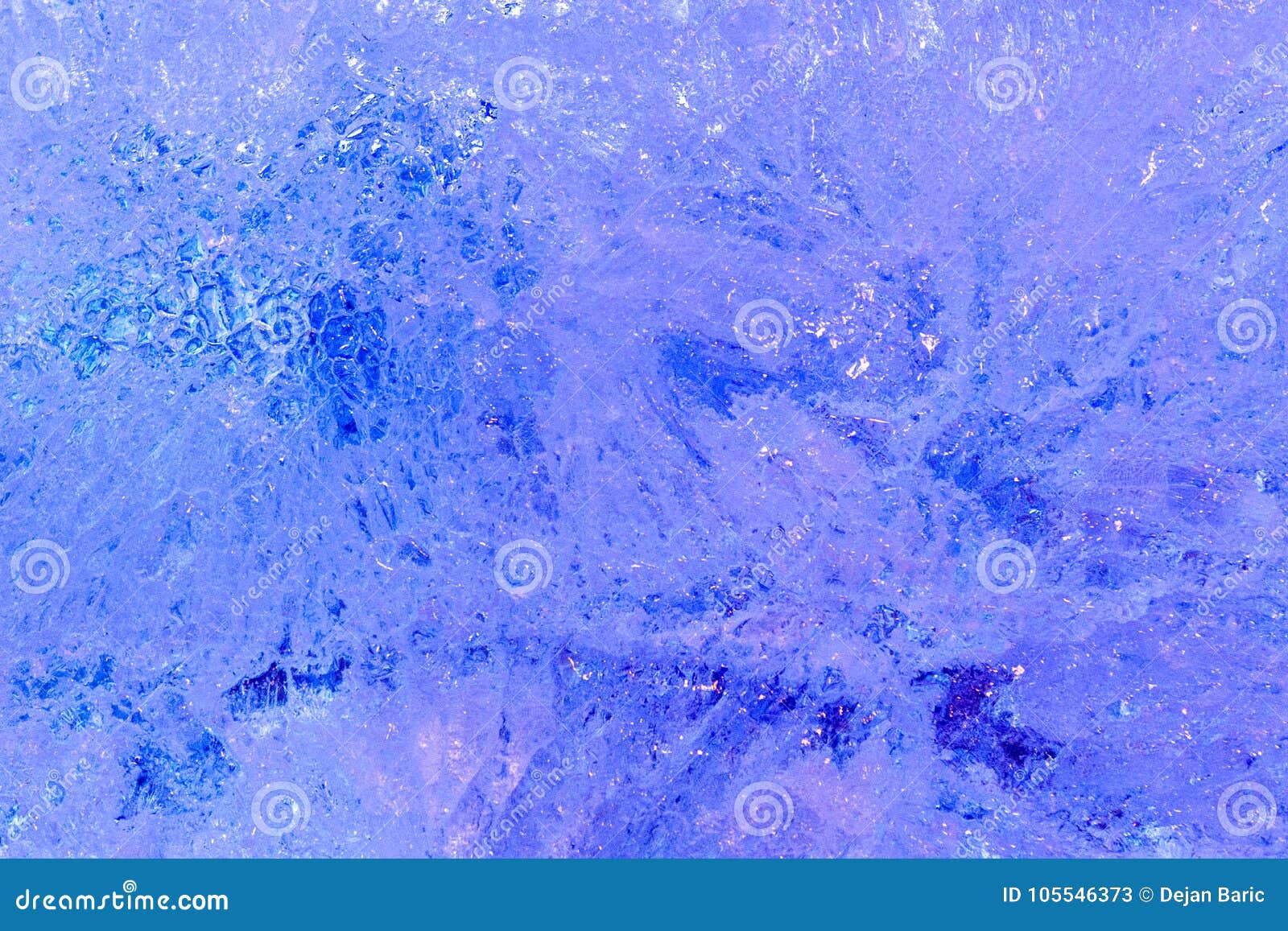 Texture of Frozen Ice Wall Illuminated with Blue and Purple Light in ...