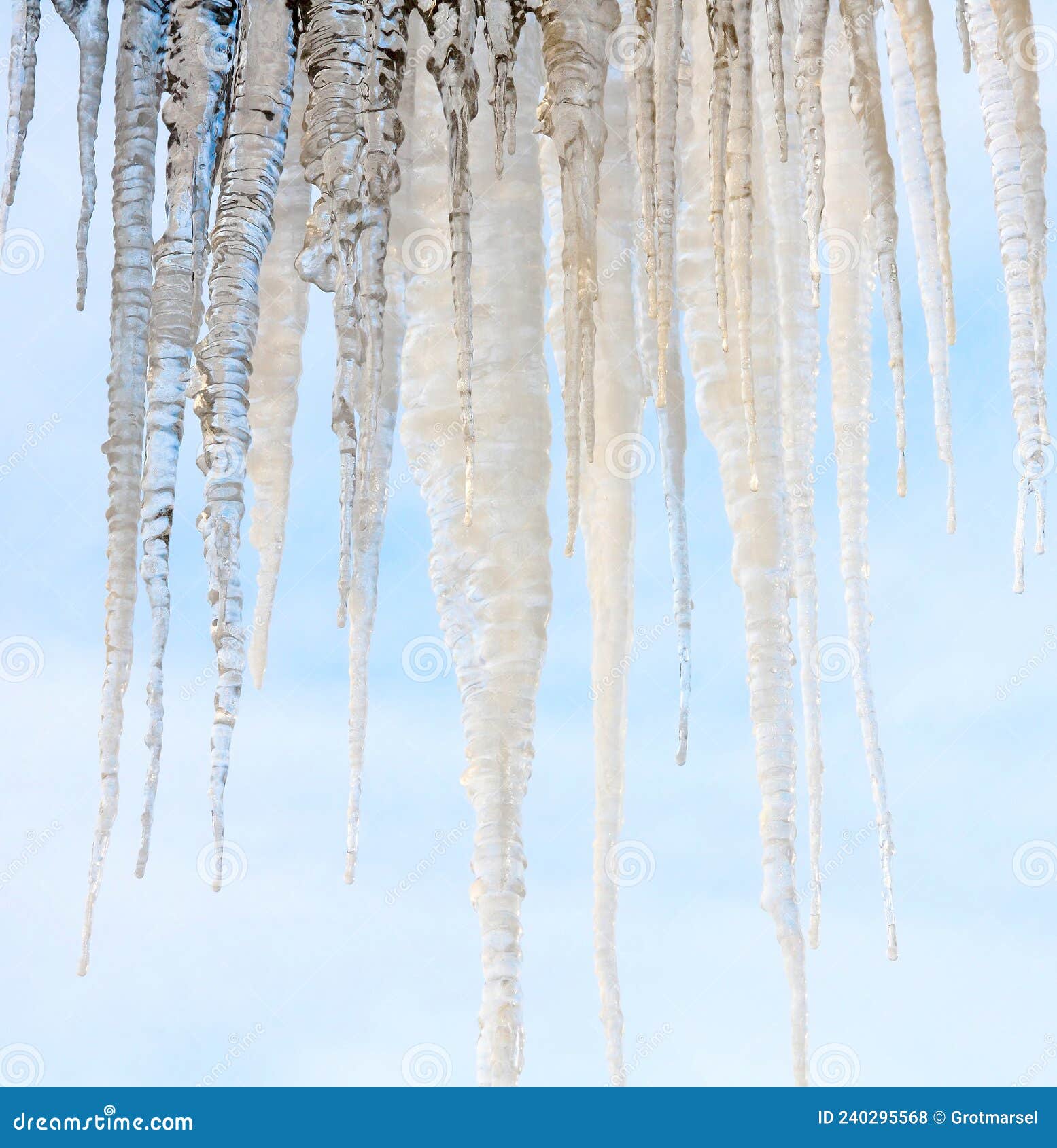 Frozen Icicles on Blue Sky Background Taken Closeup Stock Photo - Image ...