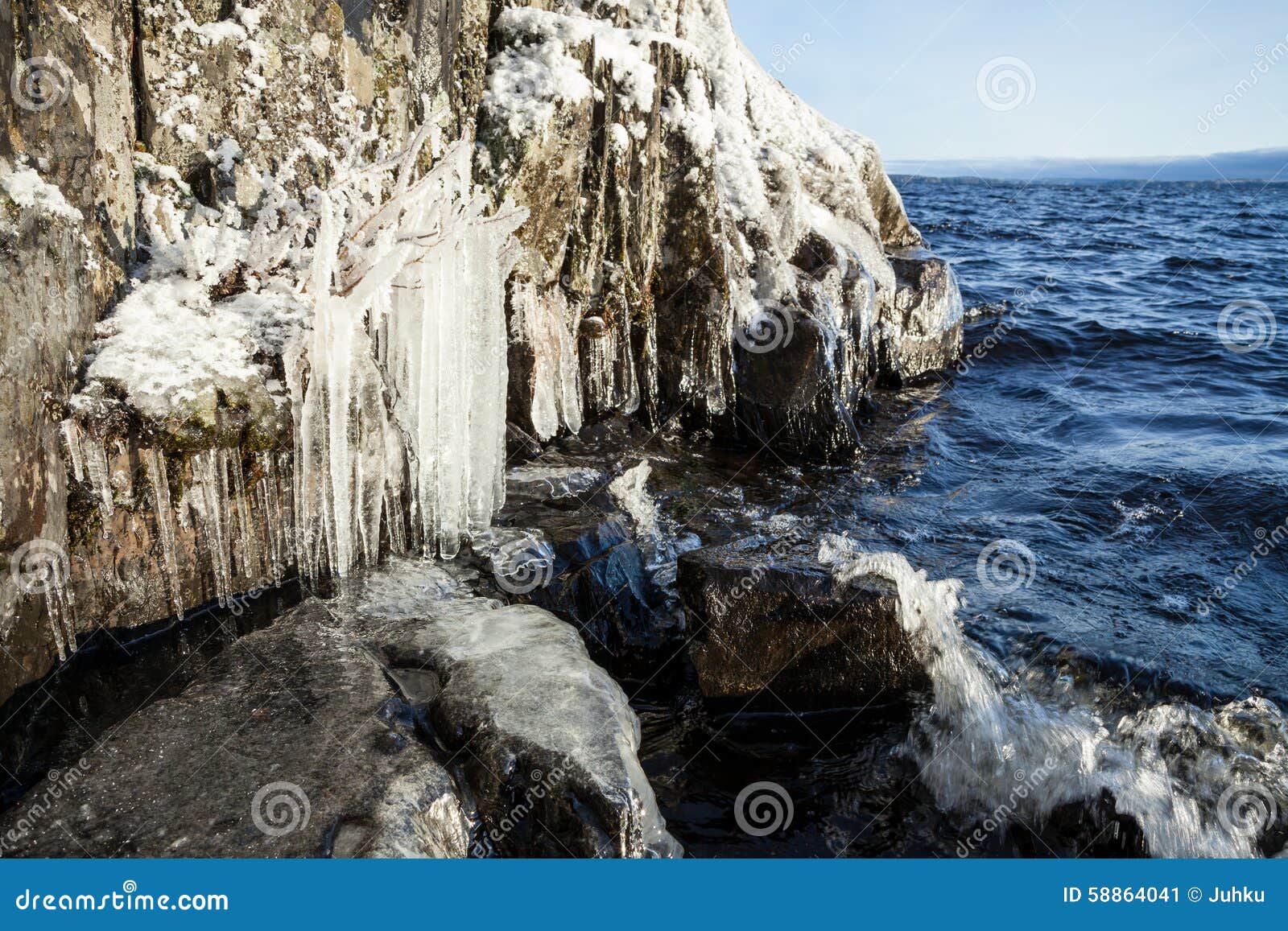 Frozen Lakefront Rock Cliff Stock Image - Image of landscape, scape ...