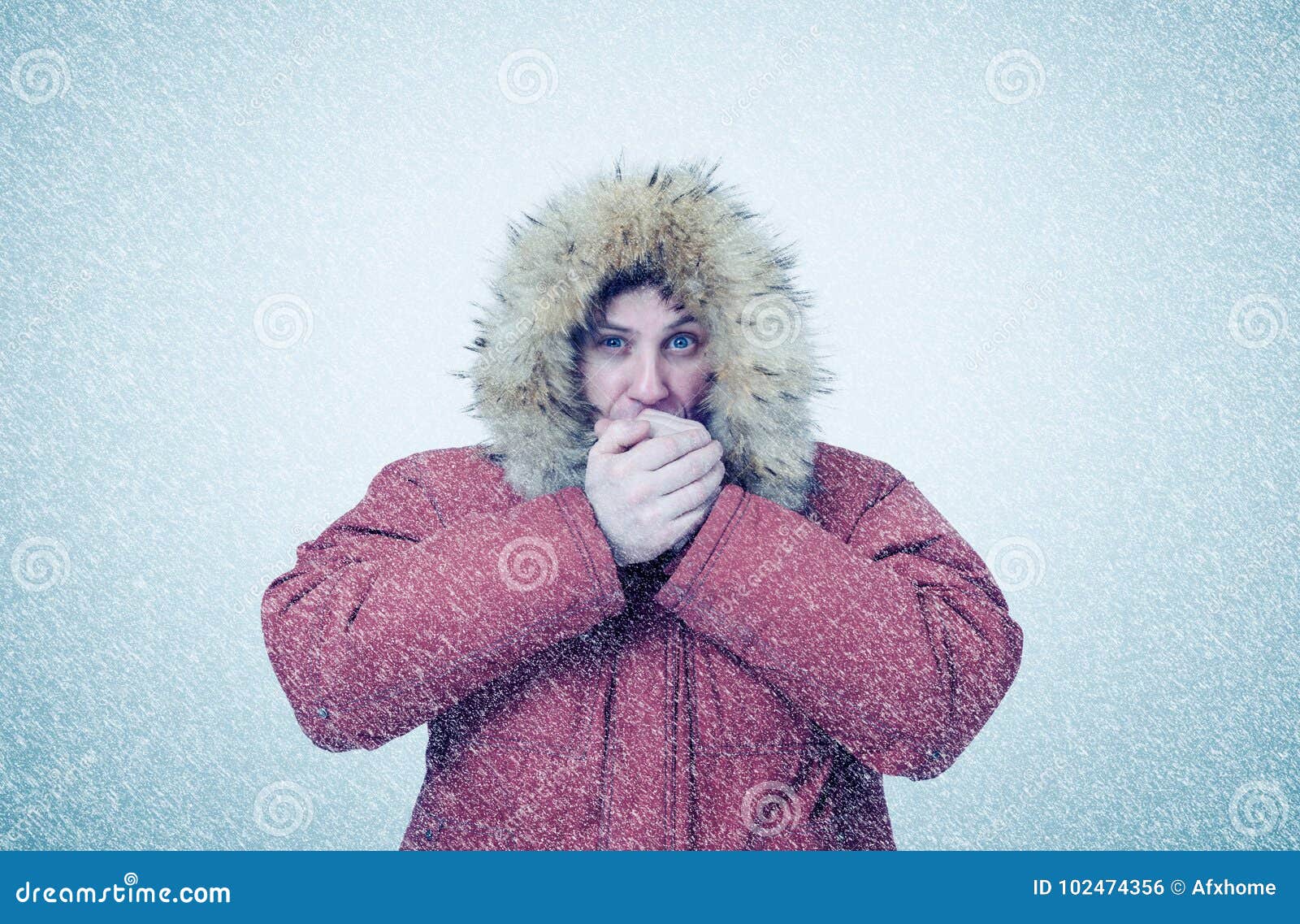 Frozen Man in Winter Clothes Warming Hands, Cold, Snow, Blizzard Stock ...