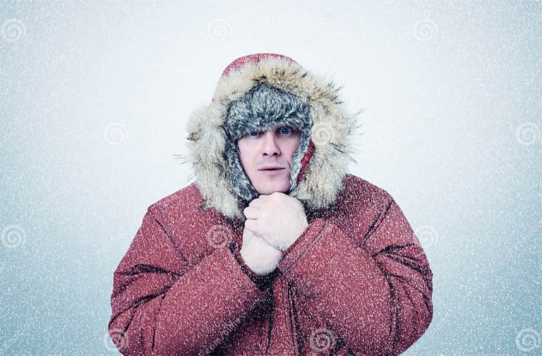Frozen Man in Winter Clothes Warming Hands, Cold, Snow, Blizzard Stock ...
