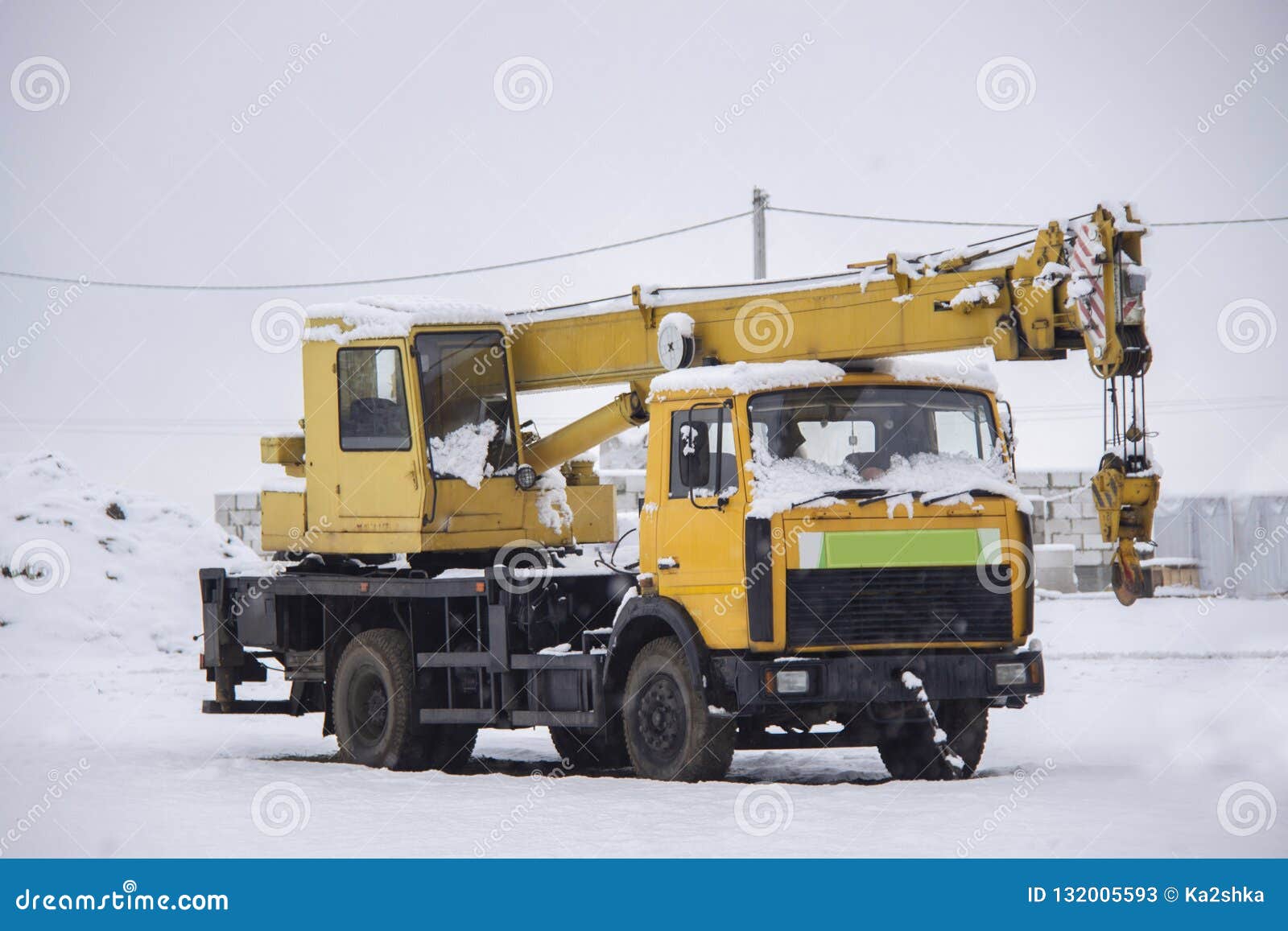 Frozen Mobile Construction Crane in the City Street in Winter Stock ...