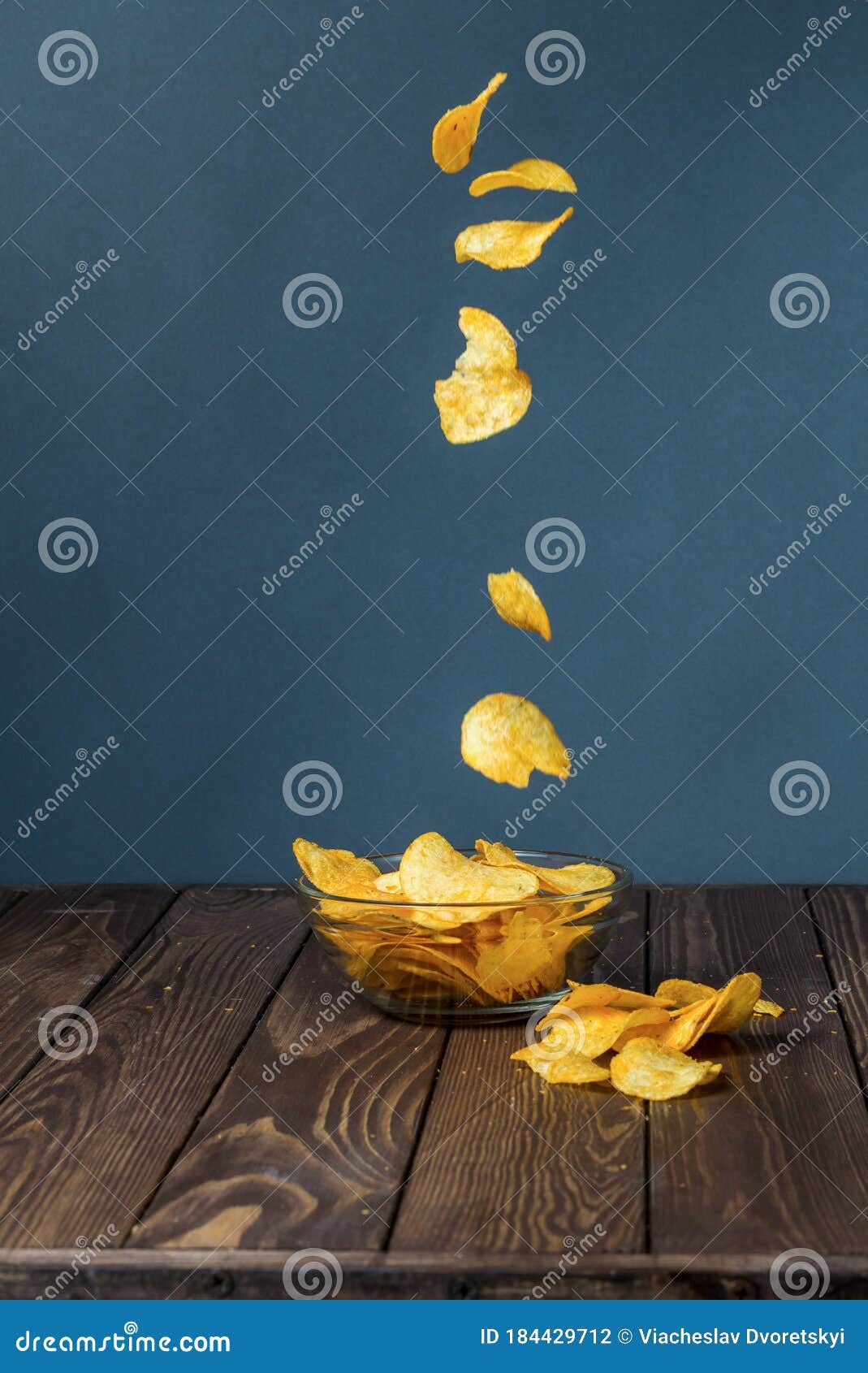 Frozen Motion. Chips Fly Over a Plate Stock Photo - Image of dish, drop ...