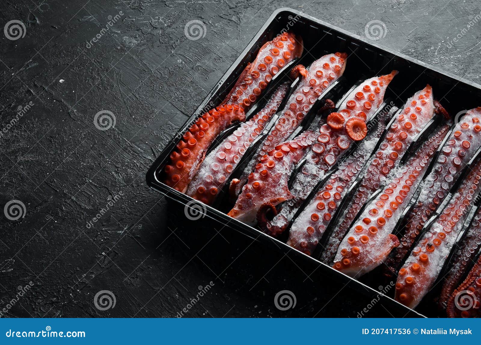 Frozen Octopus Tentacles in a Plastic Box. Stock Photo - Image of fish ...