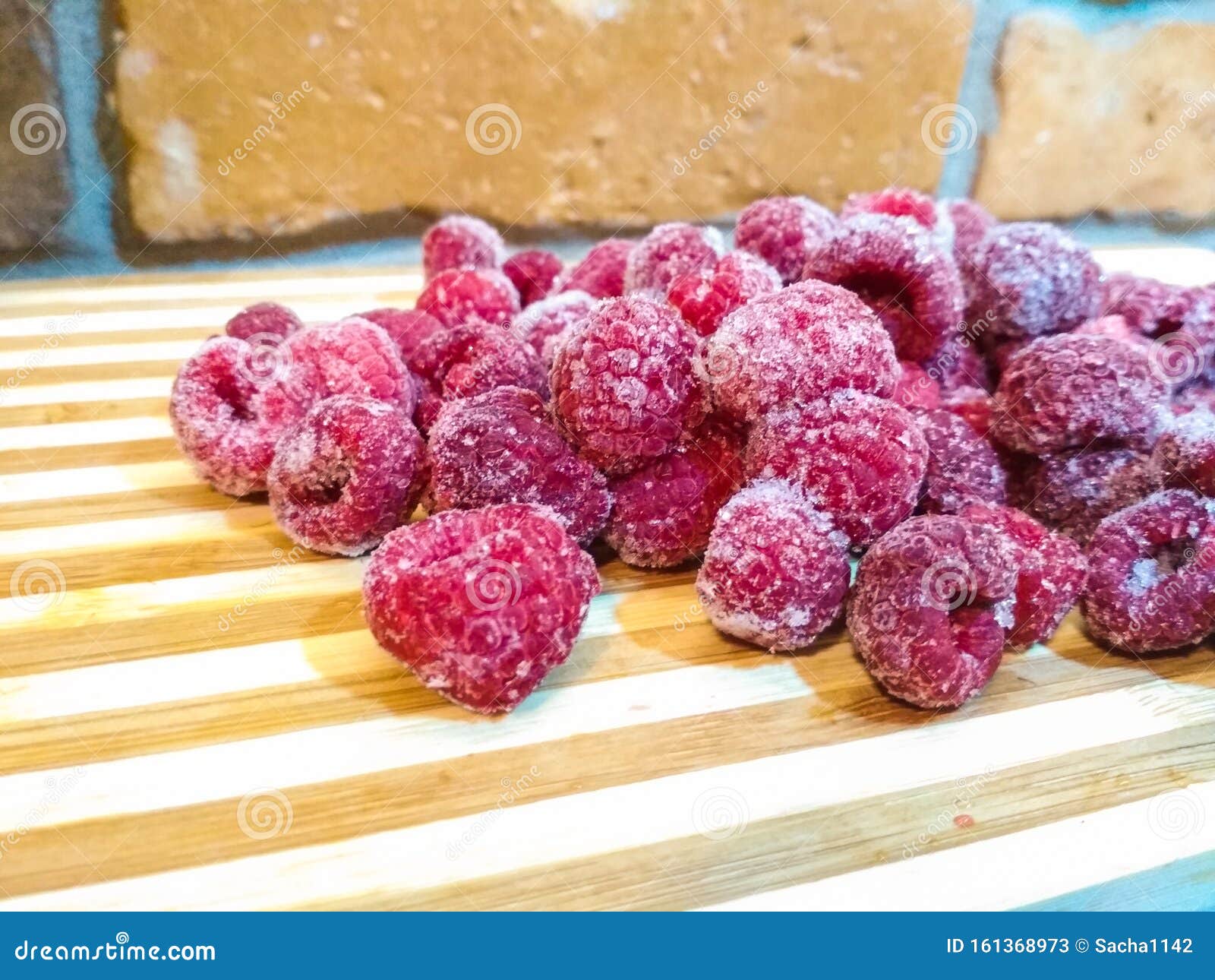 Frozen Raspberry. Close Up. Frozen Raspberries on Wooden Tables. Stock ...