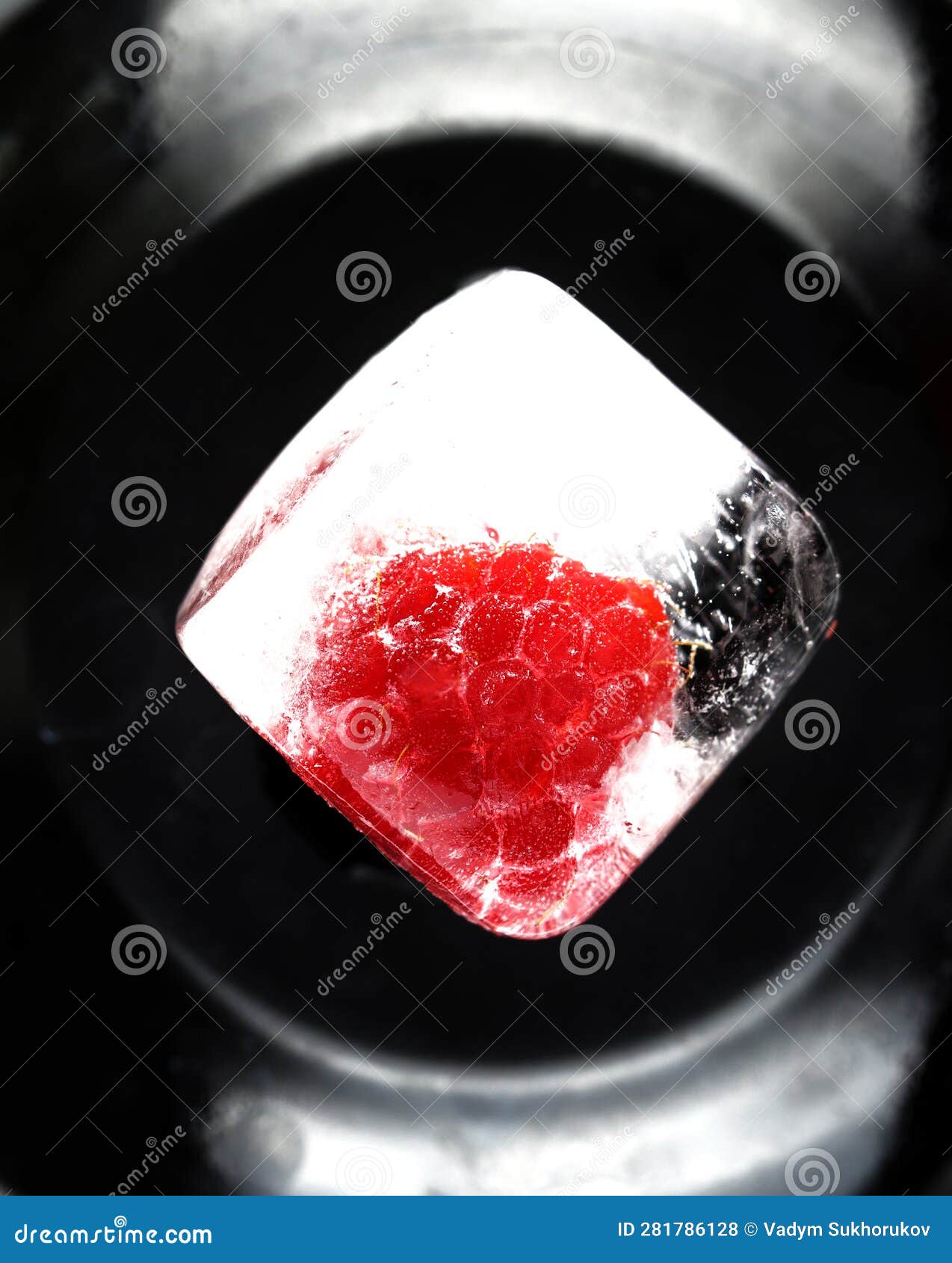 The Frozen Raspberry Inside the Ice Cube Stock Photo - Image of ...