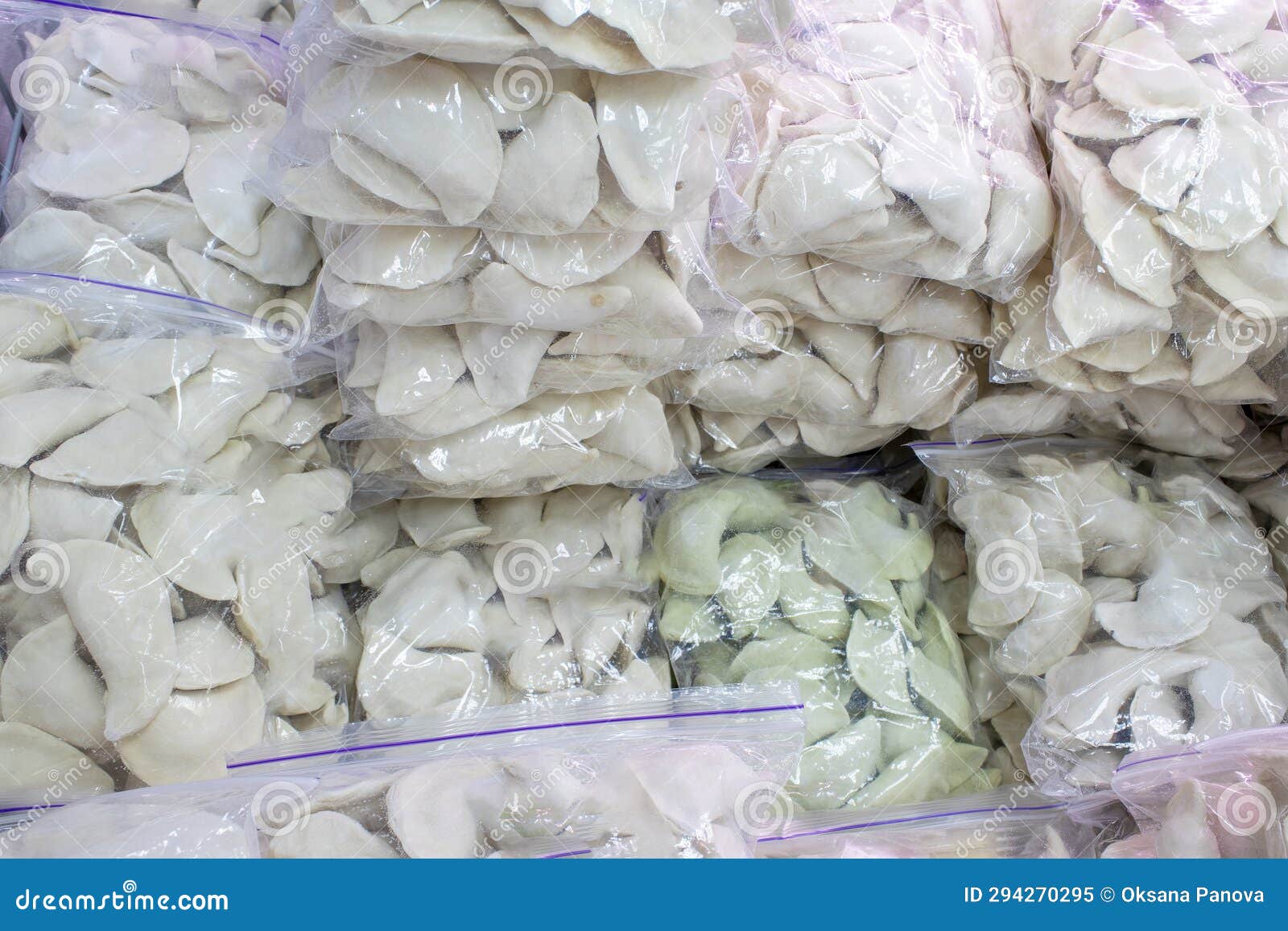 Frozen Raw Dumplings in a Transparent Bag. Large Assortment in the ...