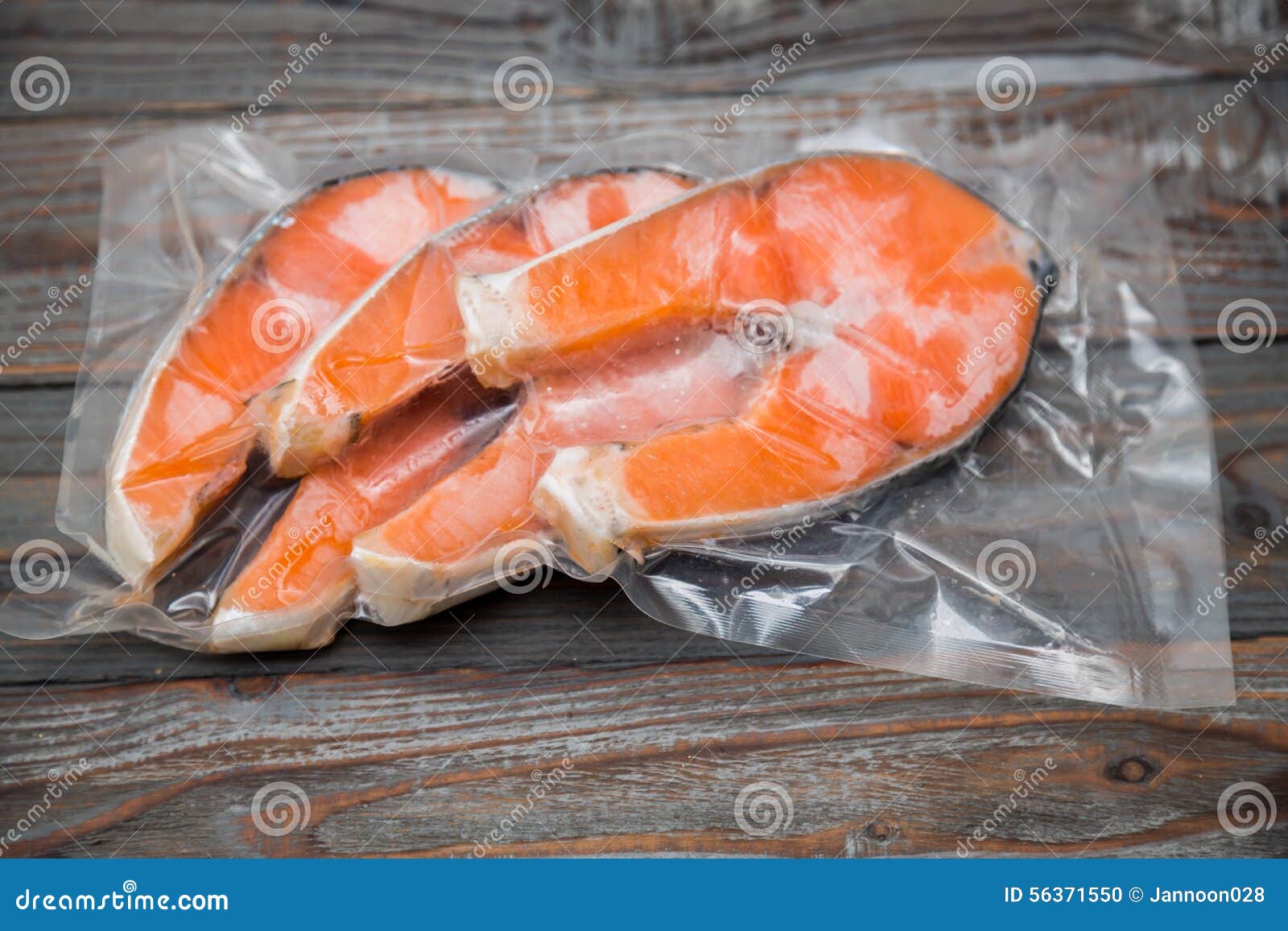 Frozen Salmon Fillets in a Vacuum Package Stock Photo - Image of slice ...