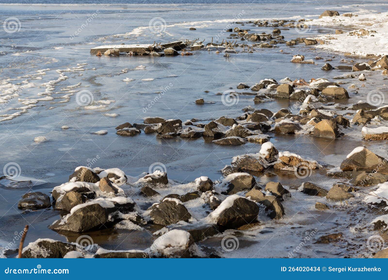 Frozen Stones on the River Bank Stock Photo - Image of covering ...