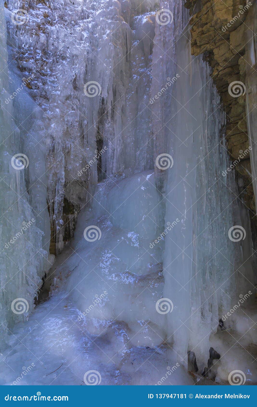 Frozen Waterfall in a Gorge High in the Mountains Stock Image - Image ...