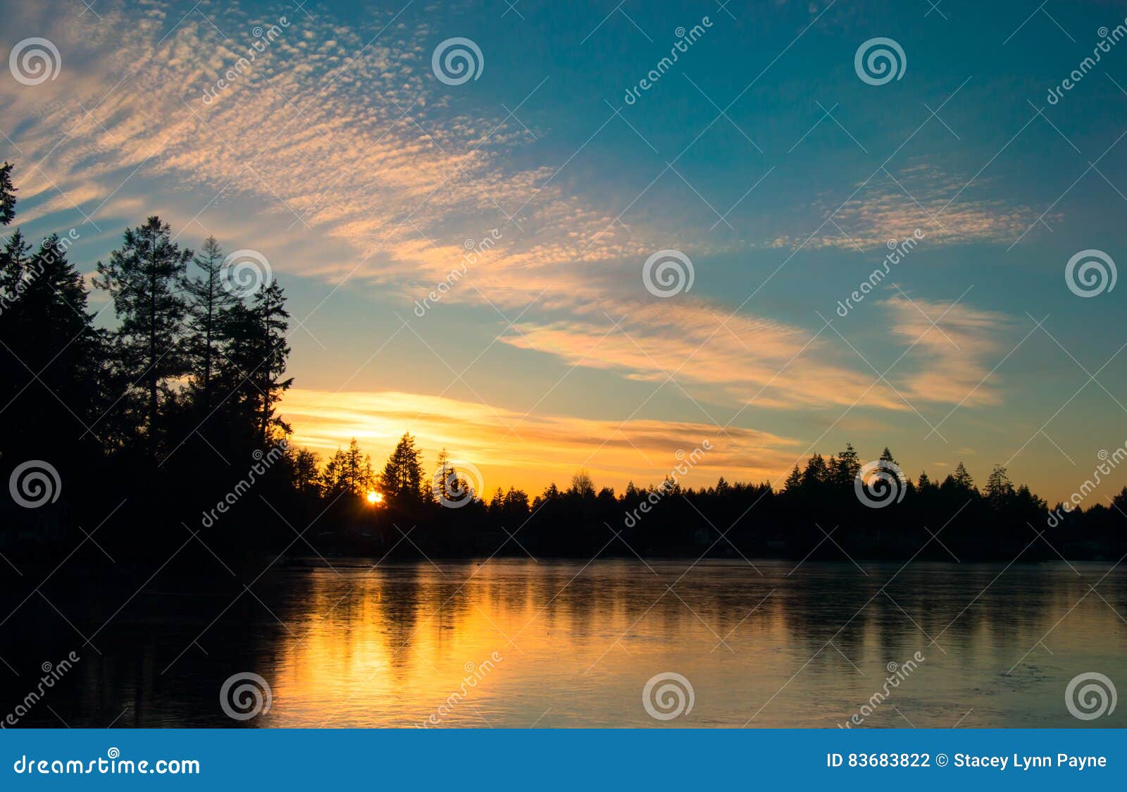 Frozen Winter Lake at Sunset Stock Photo - Image of pines, glowing ...