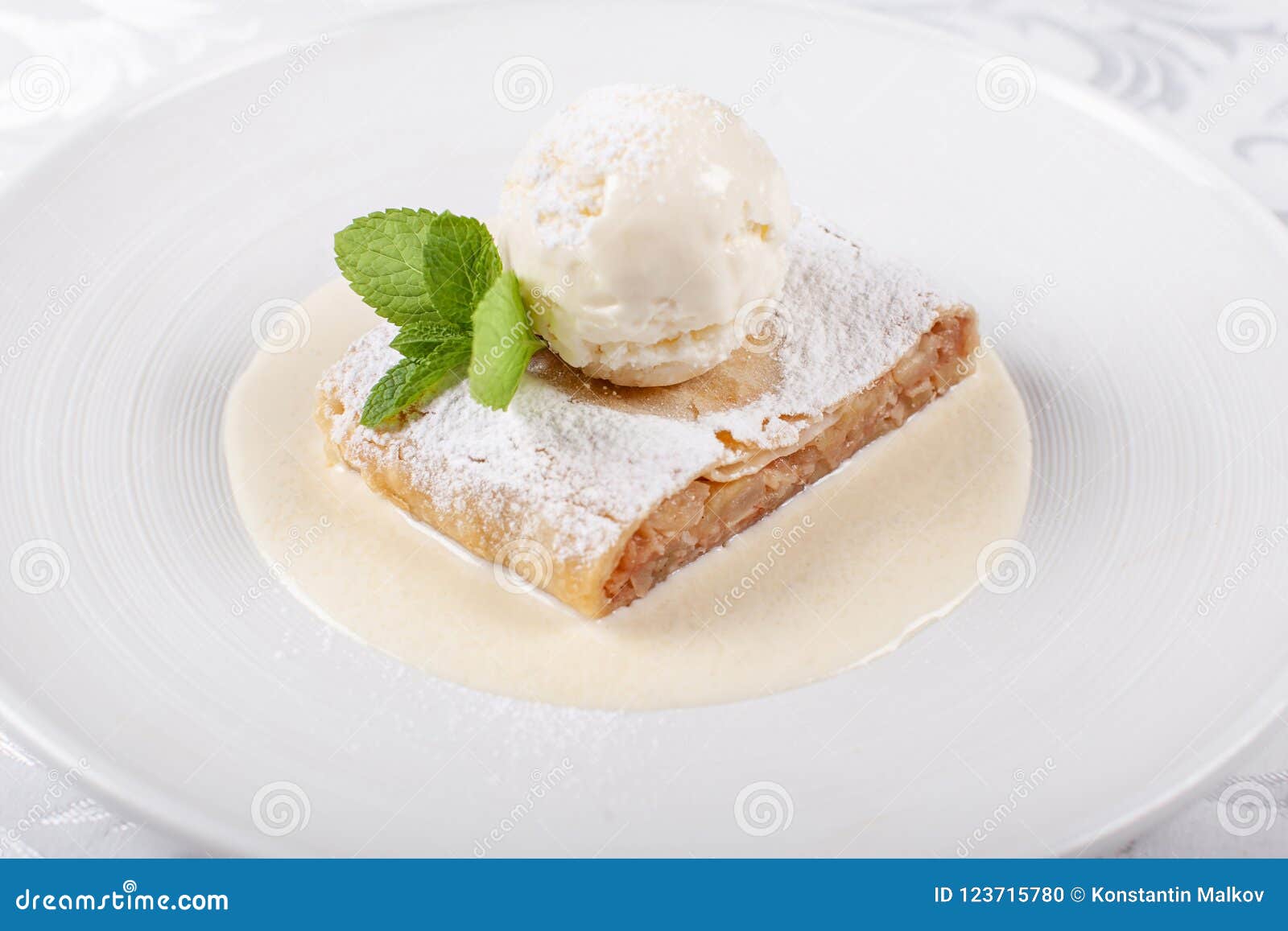 Fruit Apple Strudel Cake Served with Ice Cream, Mint Leaf and Vanilla ...