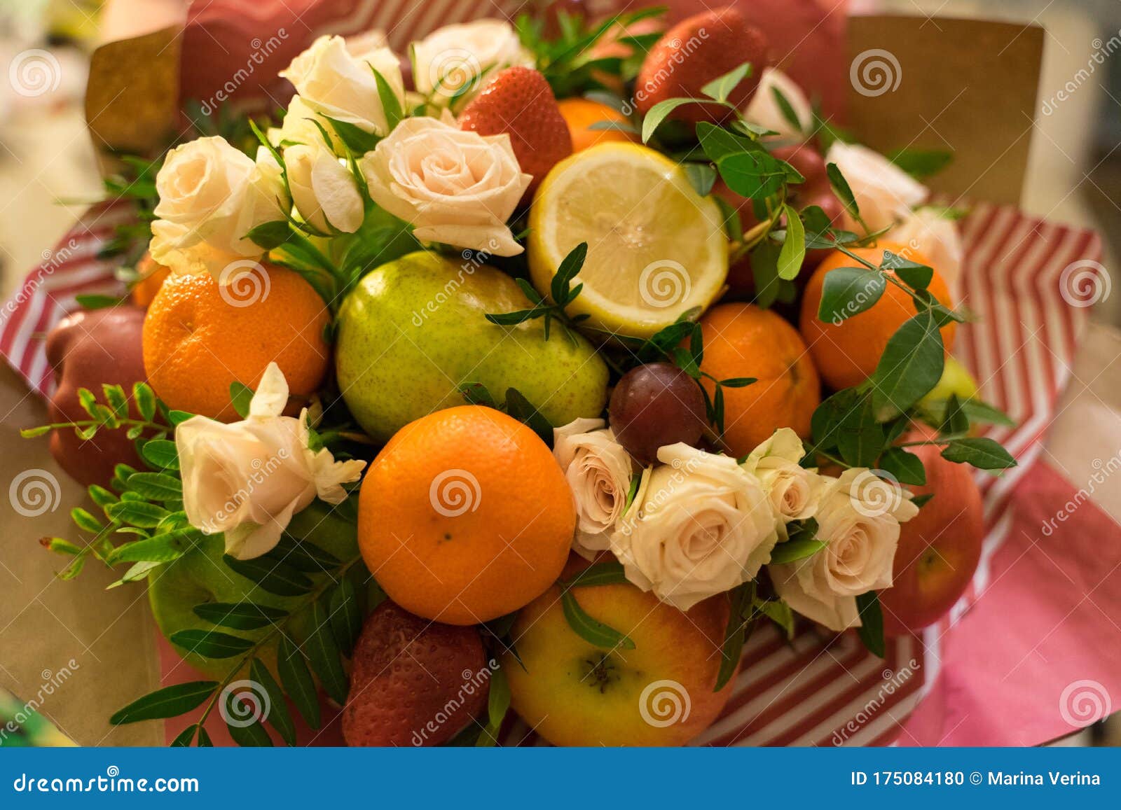 Fruit and Berry Bouquet with Roses in a Package Stock Photo - Image of ...