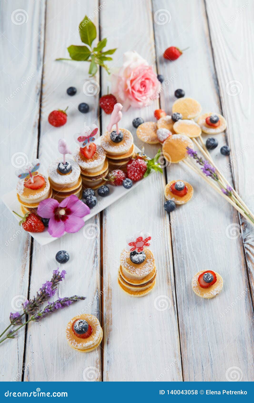 Fruit, Berry and Pancake Canapes on White Wooden Table Stock Photo ...