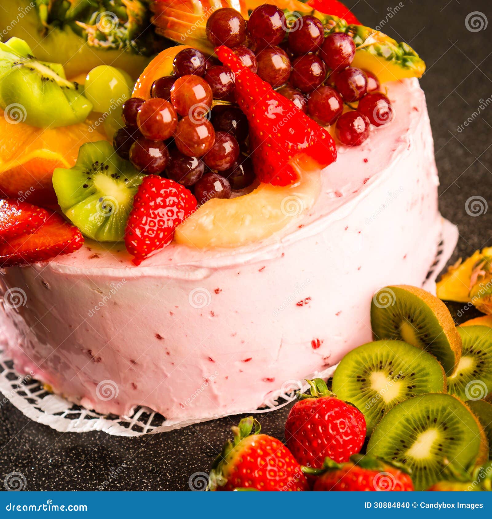 Fruit Cake with Cream Coating and Fruits Stock Photo - Image of ...
