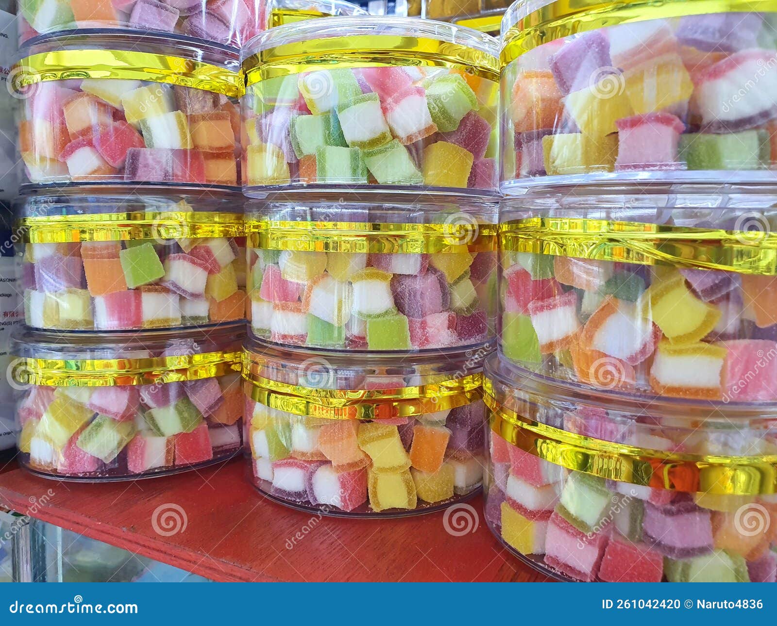 Fruit candy in plastic box stock photo. Image of cherry - 261042420
