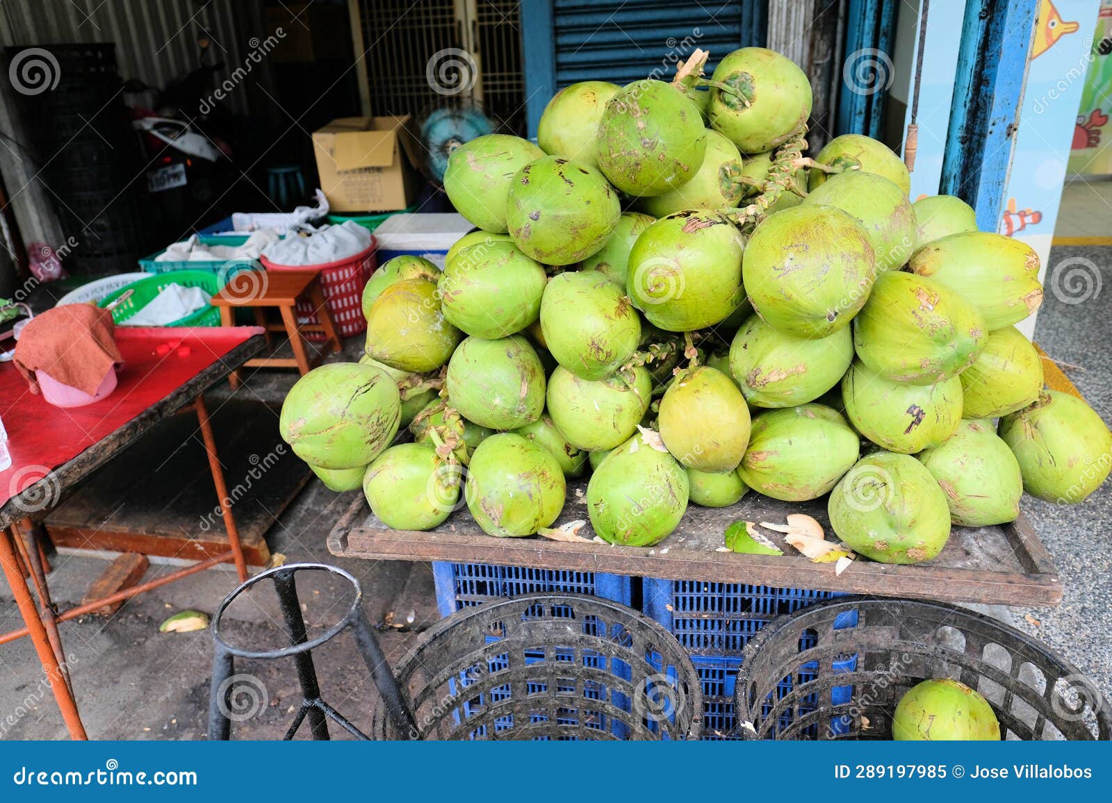 Stack of Green Coconuts on an Improvised Table for Street Vending Stock ...