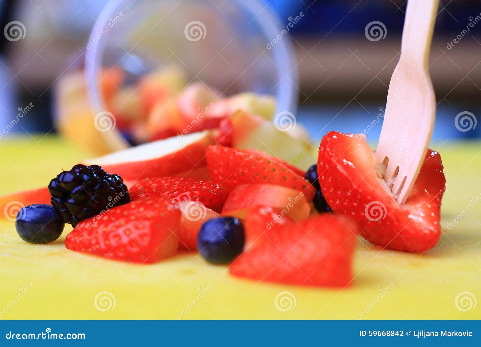 Fruit Cup with a Fork and Spilled Fruits Stock Photo - Image of blur ...