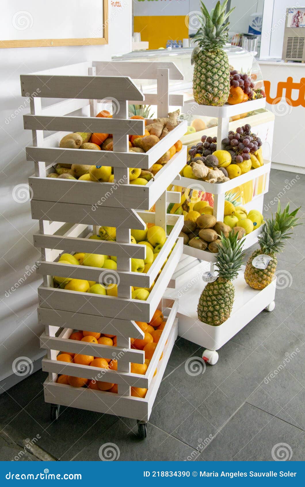 Fruit display stand. stock photo. Image of assorted - 218834390