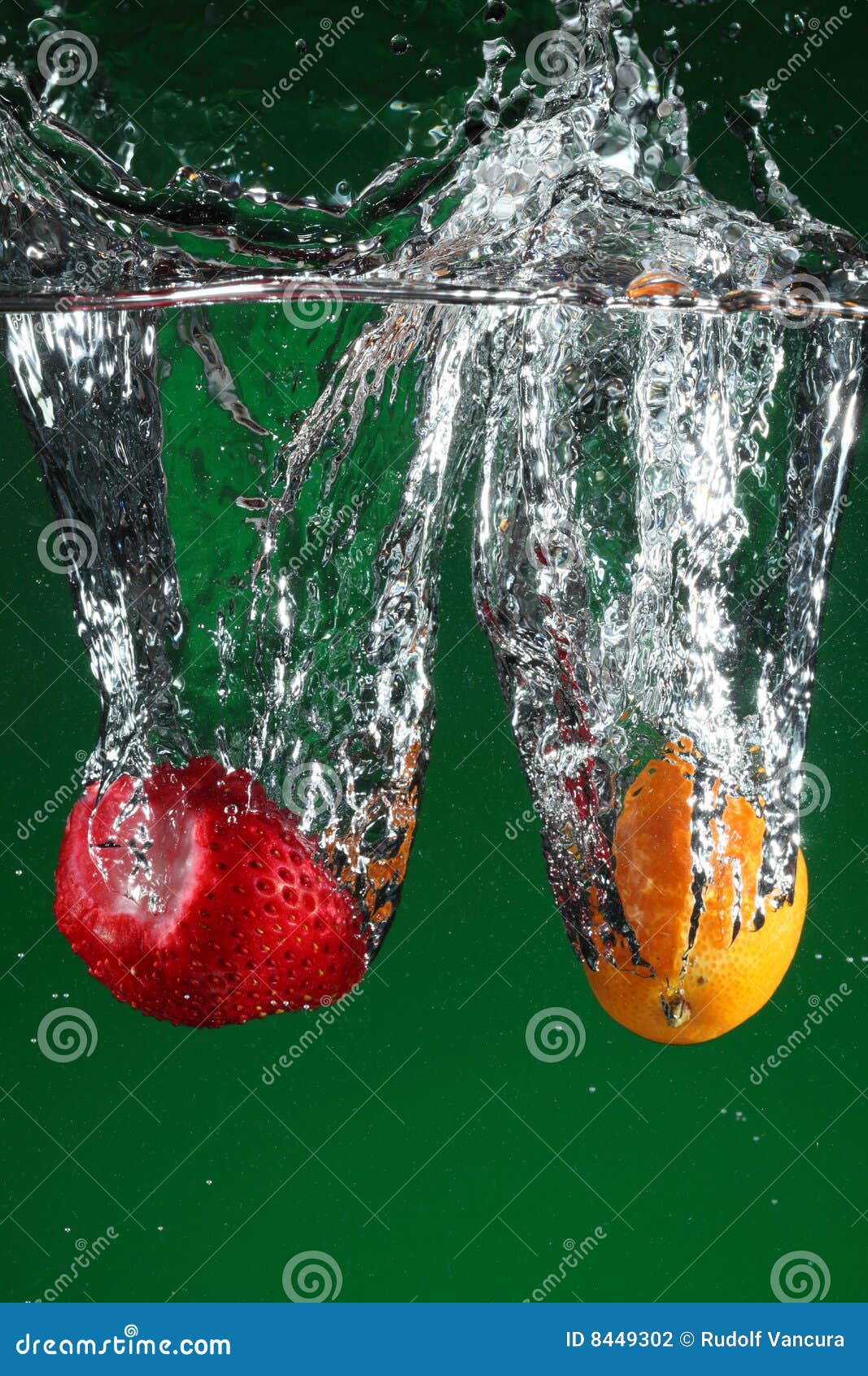 Fruit falling into water stock photo. Image of green, macro - 8449302