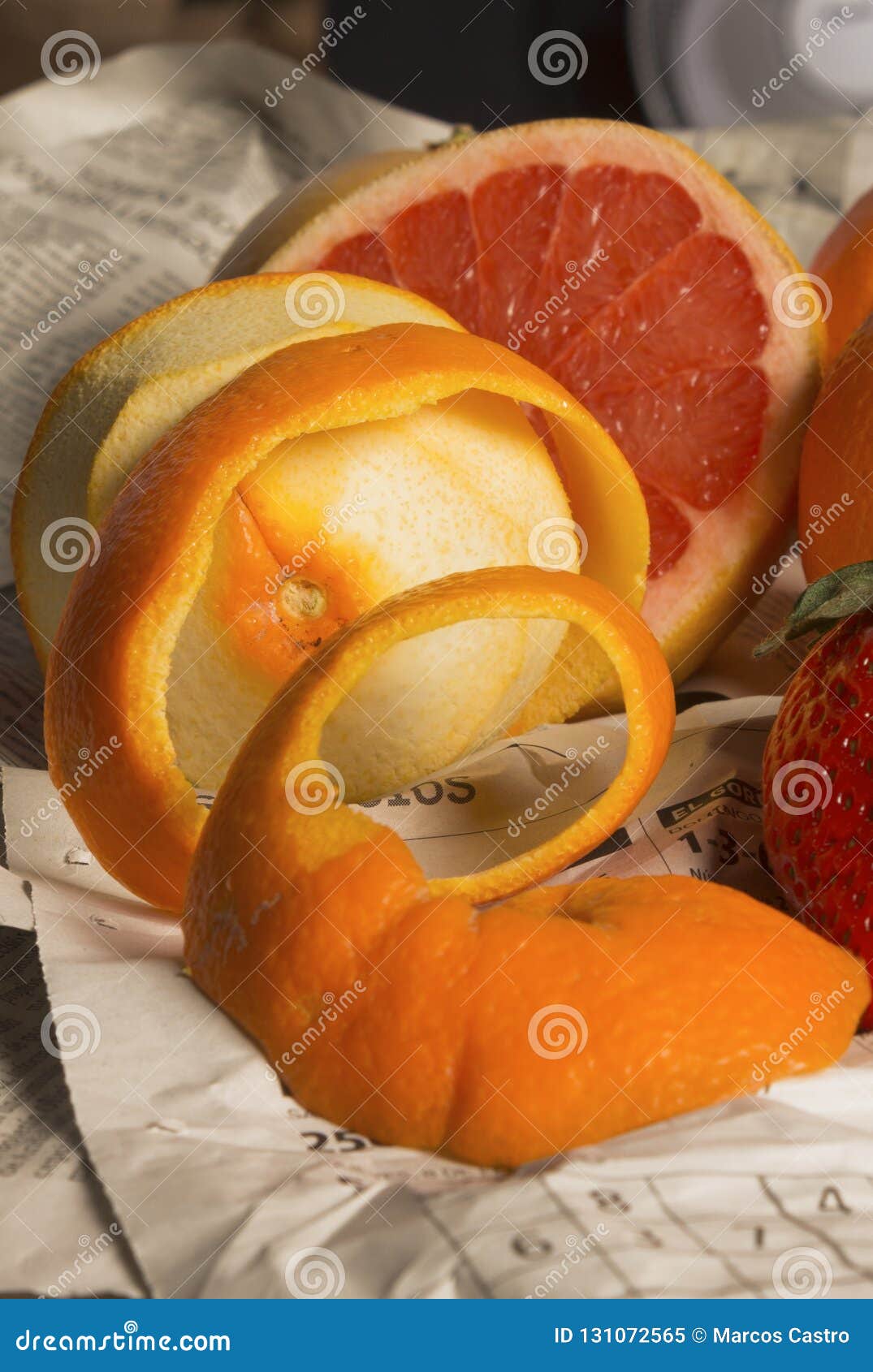 Fruit over a newspaper stock image. Image of pursple - 131072565