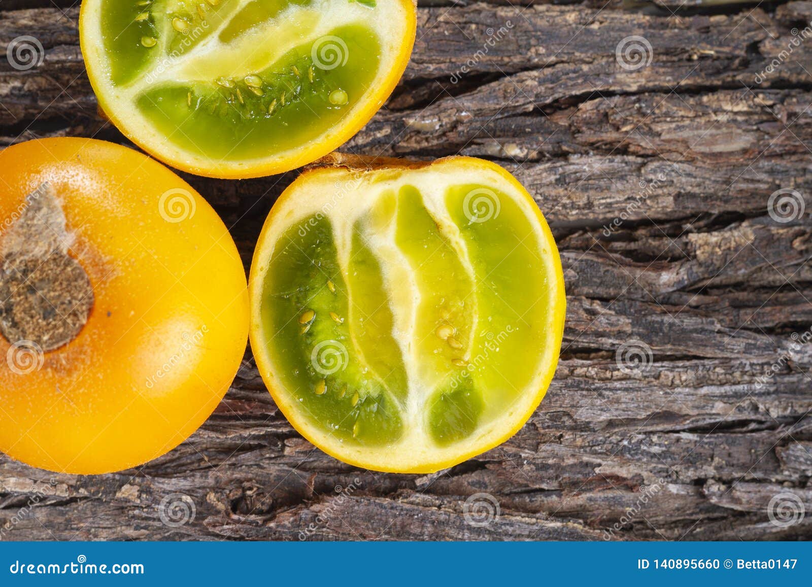 Fruit of lulo on tree bark stock photo. Image of solanum - 140895660