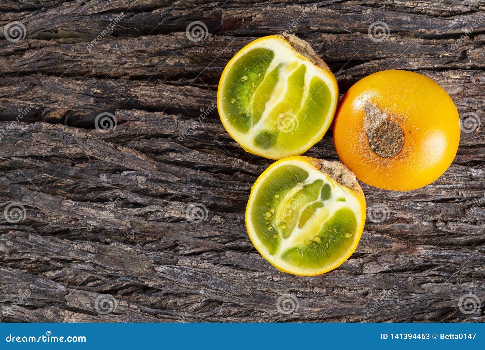 Fruit of lulo on tree bark stock image. Image of tropical - 141394463