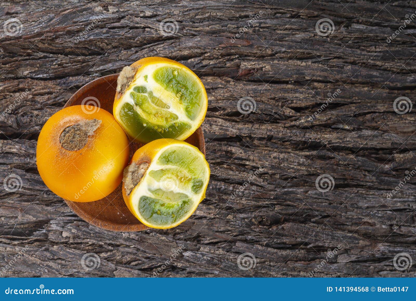 Fruit of lulo on tree bark stock photo. Image of solanum - 141394568