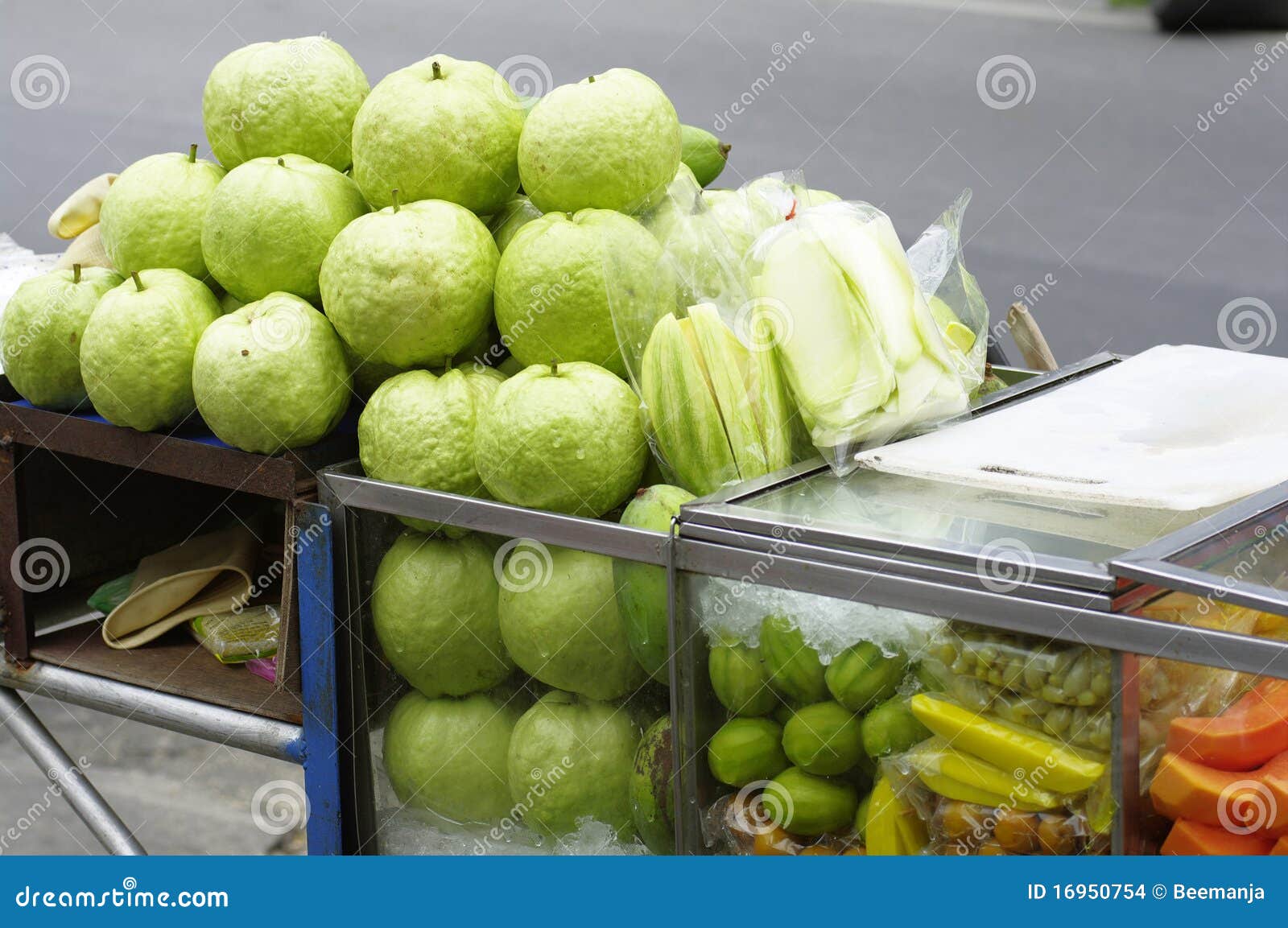 Fruit mix in wheelbarrow stock photo. Image of guava - 16950754