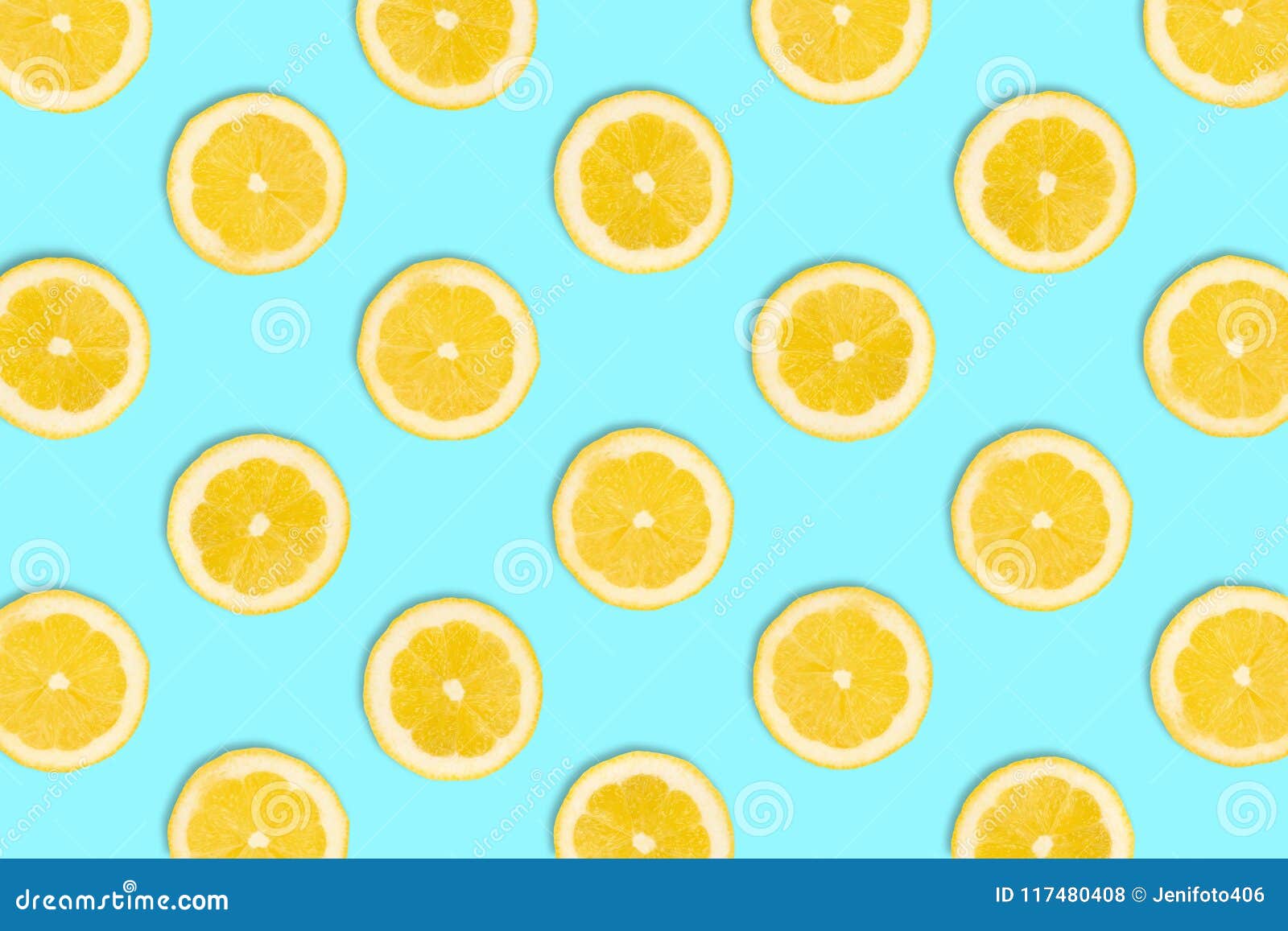 Fruit Pattern of Lemon Slices on a Pastel Blue Background Stock Photo ...
