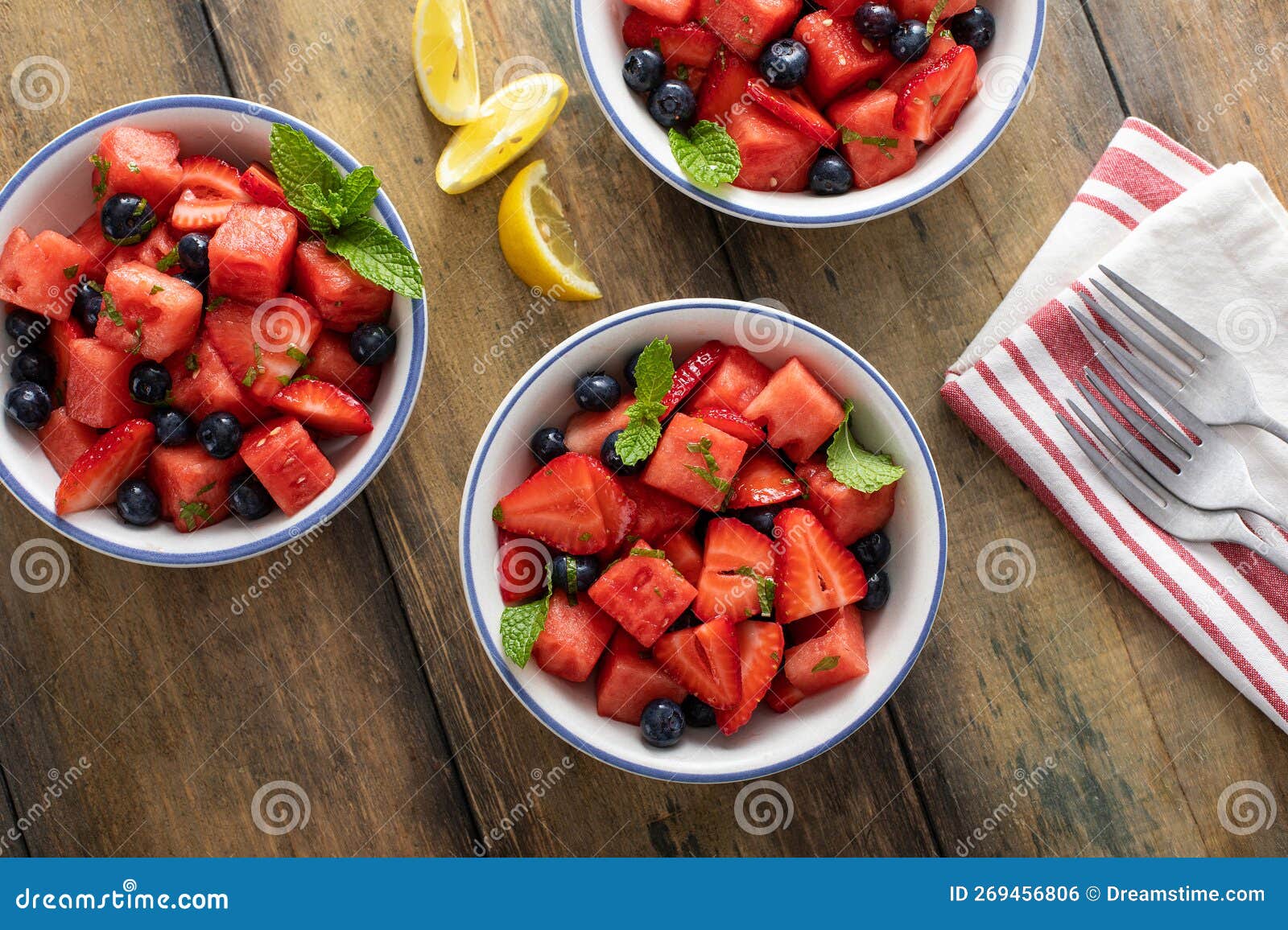 Fruit Salad with Watermelon and Berries, Mint and Lemon Stock Photo ...