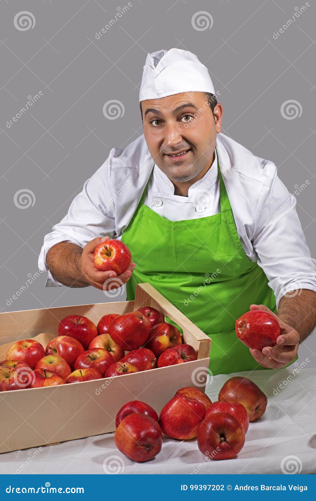 Fruit Seller with Box of Apples Stock Photo - Image of clothes ...