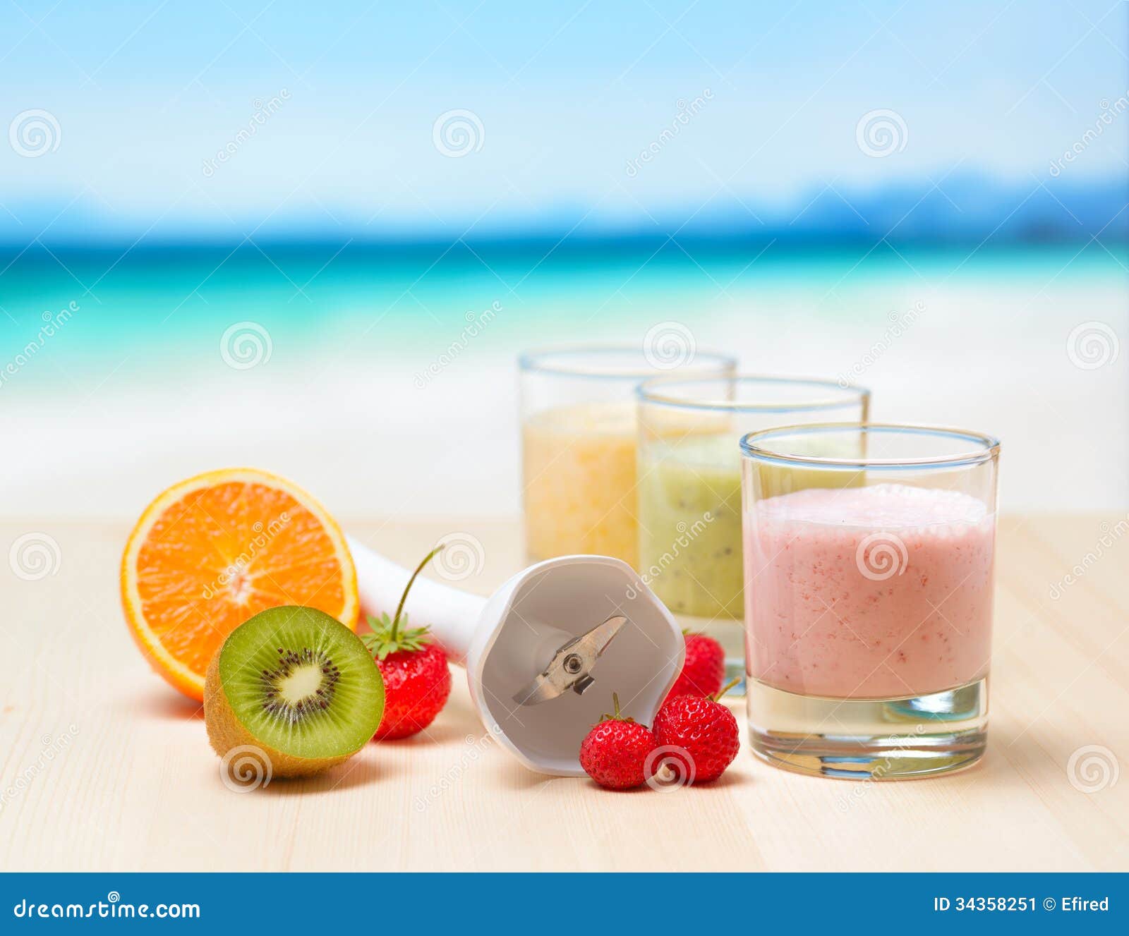 Fruit Smoothie on Wooden Table on Tropical Beach Stock Image - Image of ...