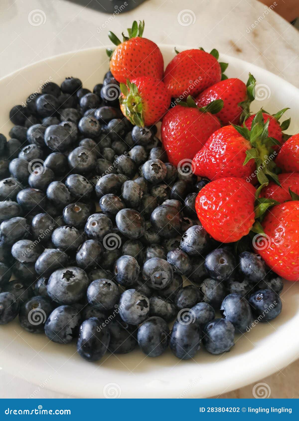 Fruit strawberry blueberry stock photo. Image of evergreen - 283804202