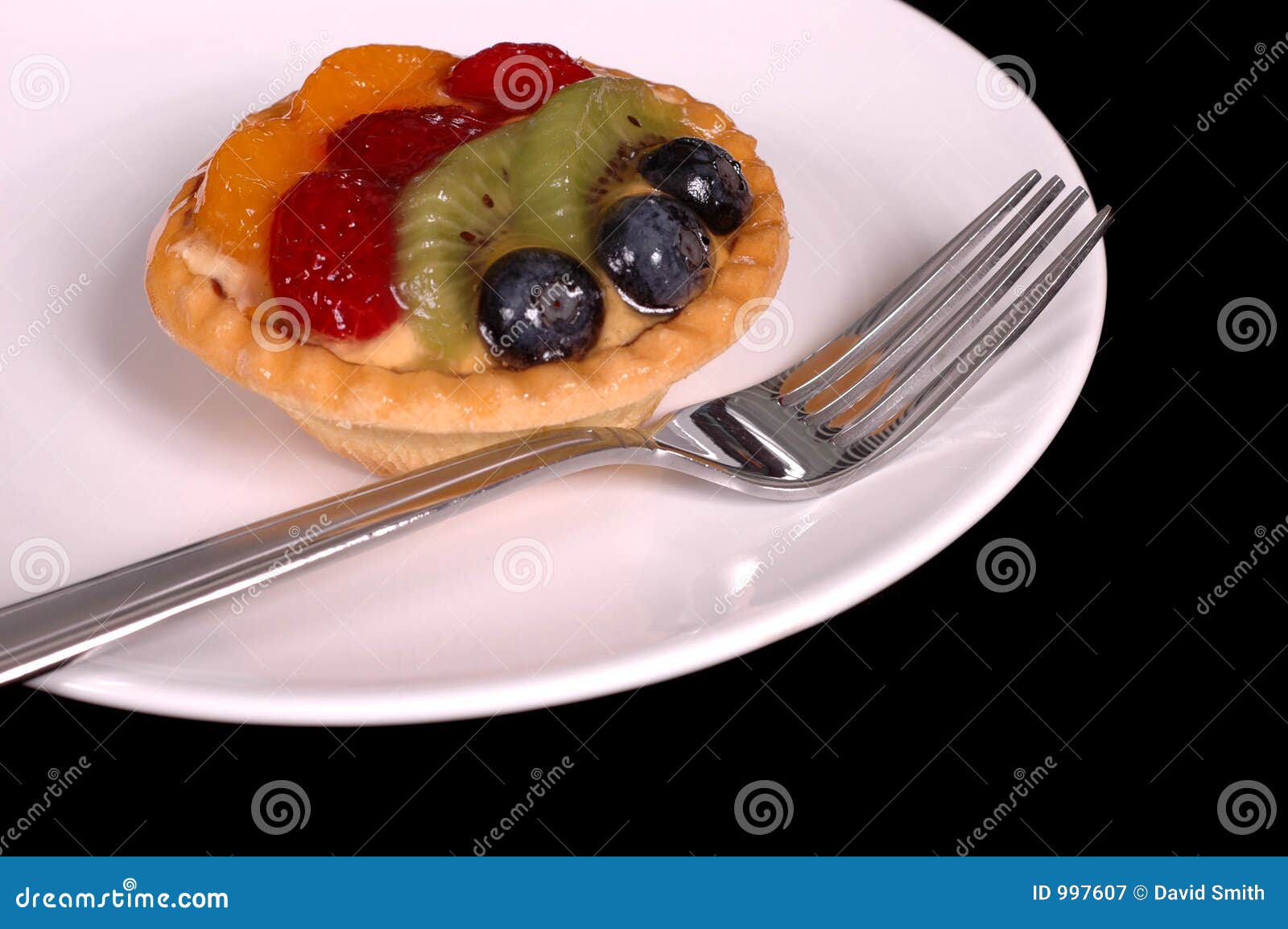 Fruit tart on plate 2 stock image. Image of cream, plate - 997607