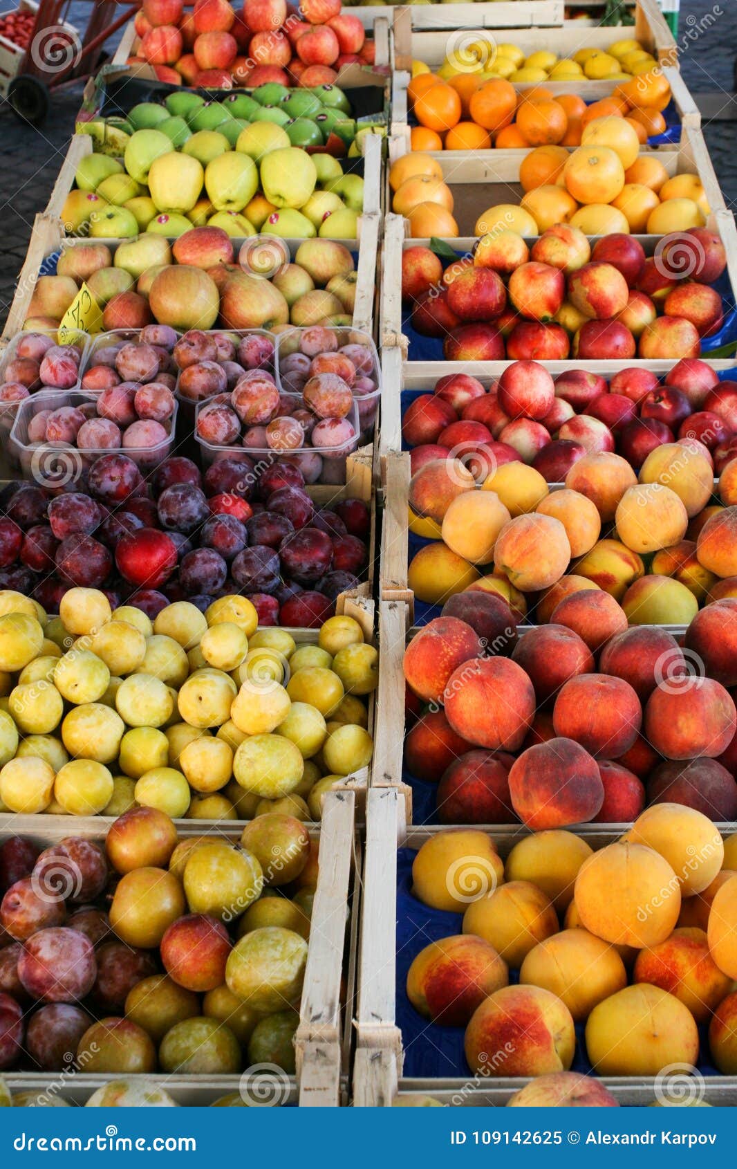 Fruit in wooden boxes stock image. Image of orange, crate - 109142625