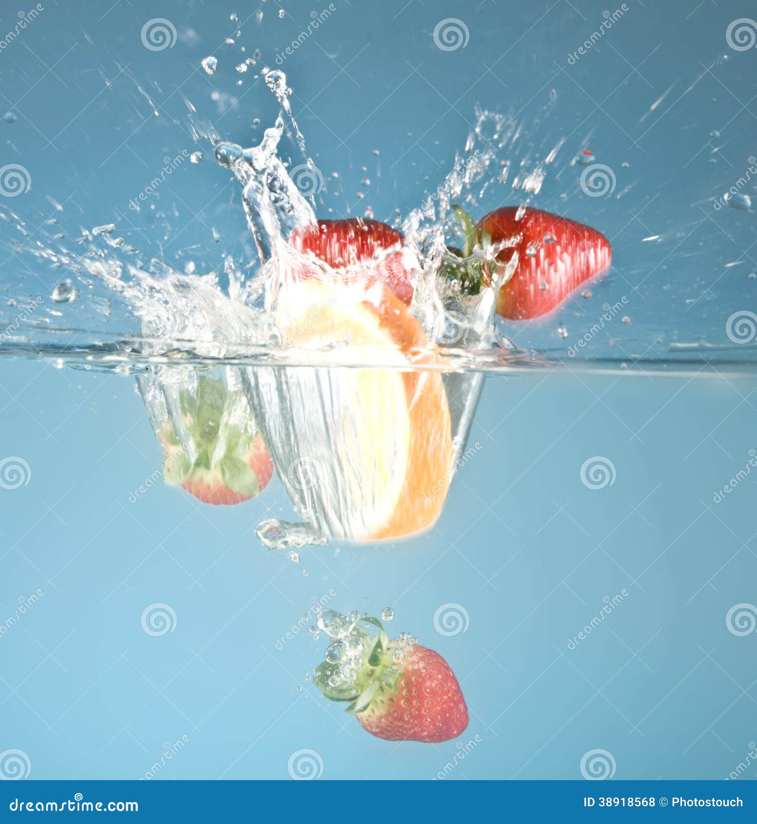 Fruits splashed into water stock photo. Image of citrus - 38918568