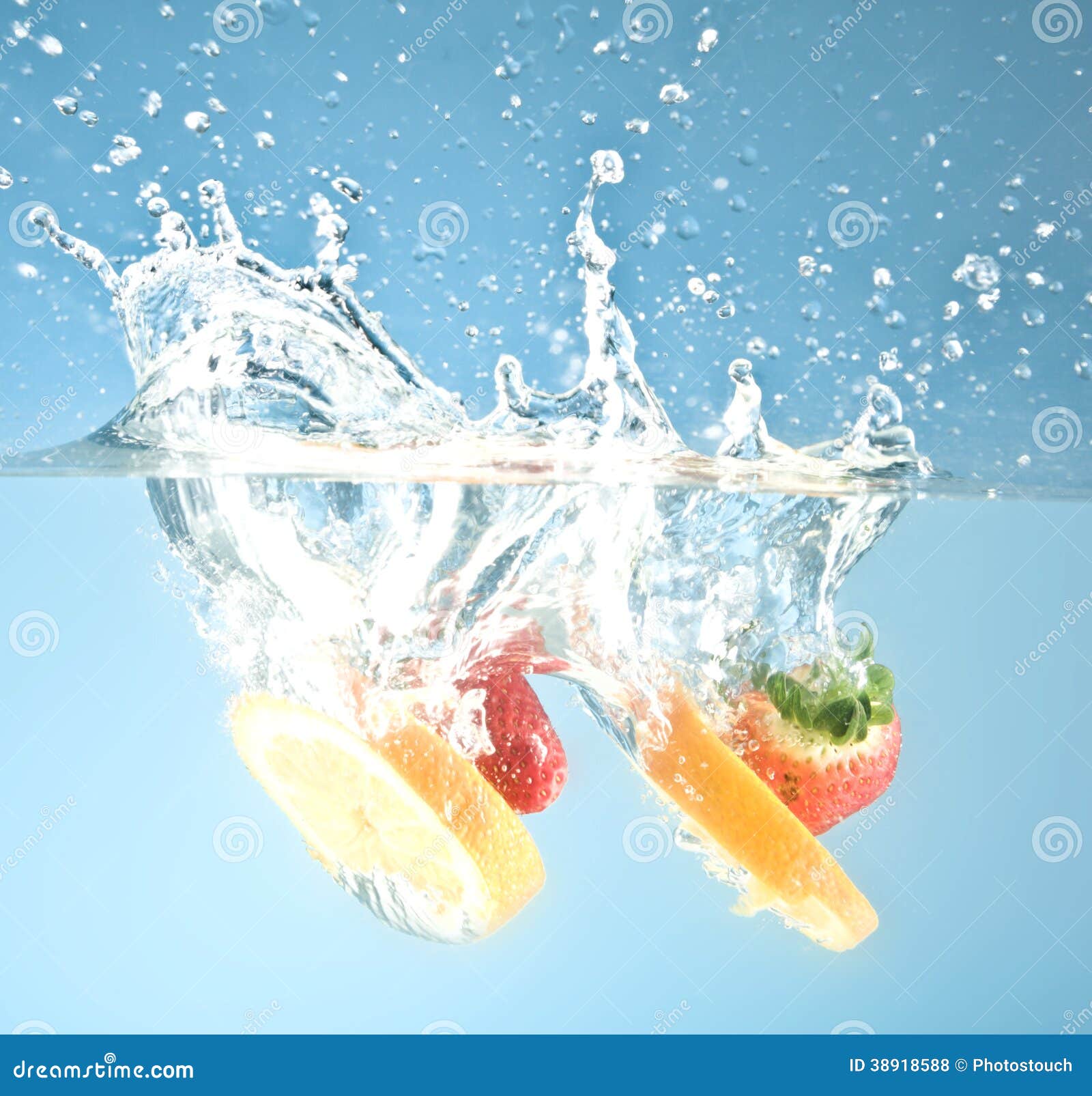Fruits splashed into water stock photo. Image of slice - 38918588