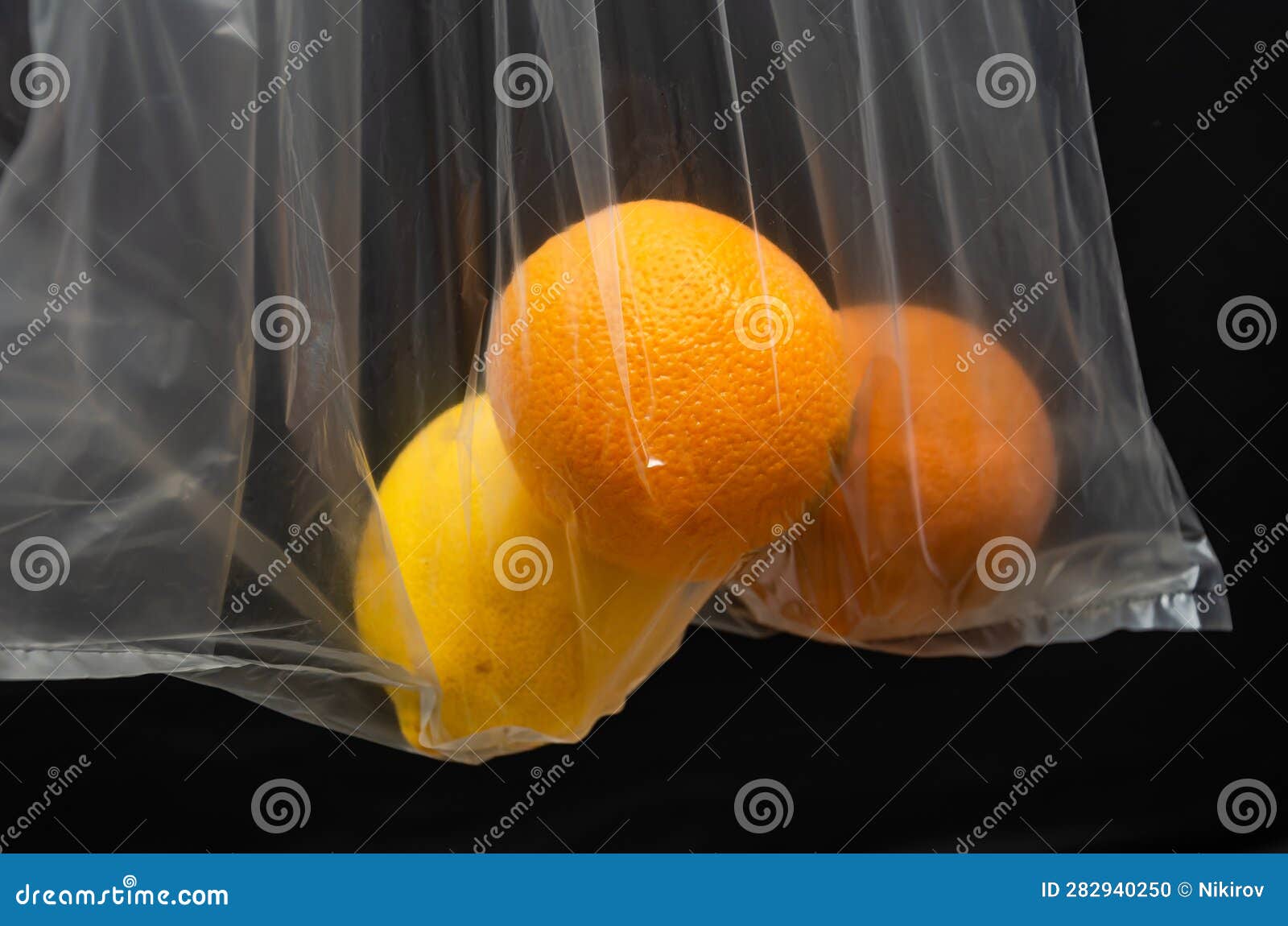 Fruits in a Transparent Plastic Bag Stock Photo - Image of background ...