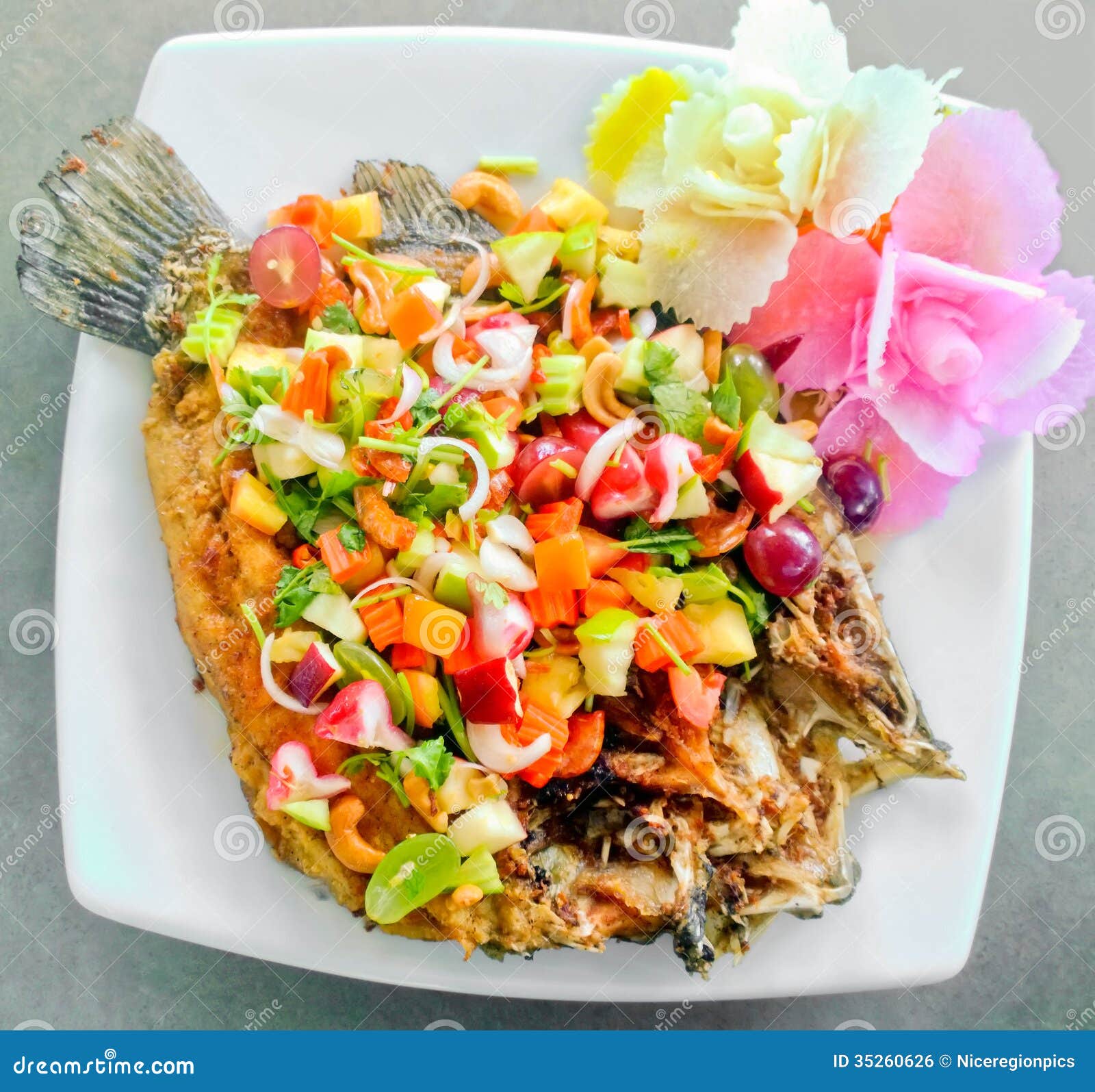 Fruits and Vegetables (herbs) on the Fried Fish. Stock Photo - Image of ...