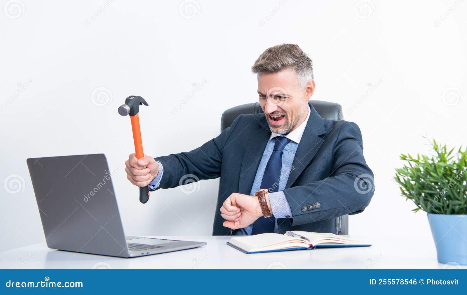 Frustrated Boss Hitting Laptop with Hammer and Checking Time Stock ...