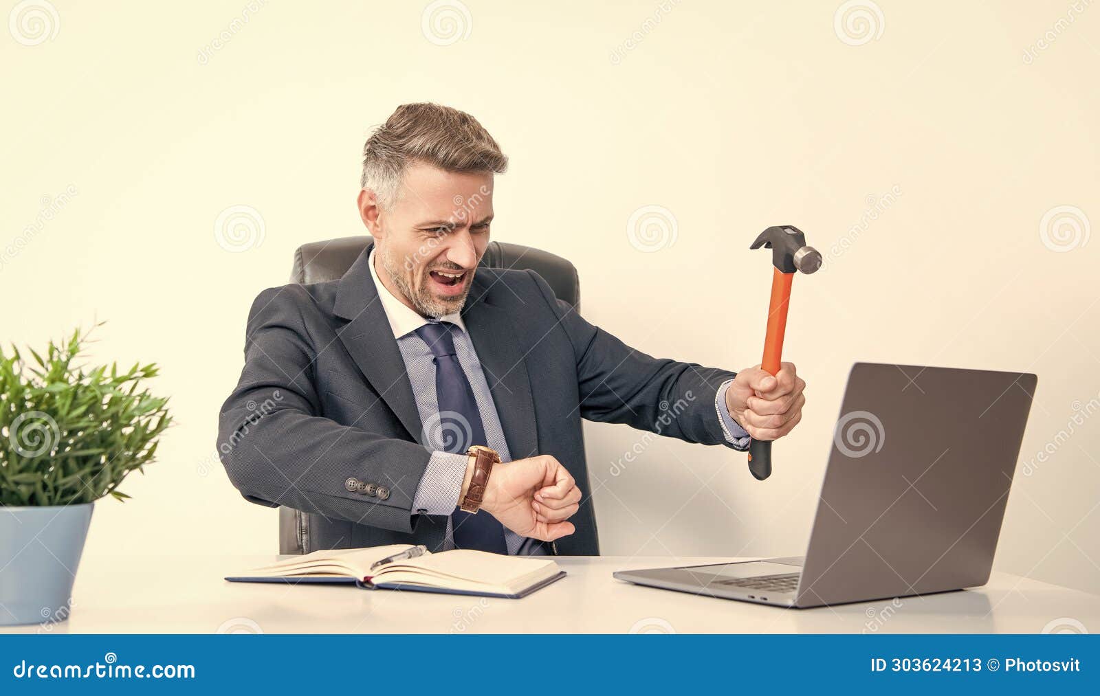 Frustrated Boss Hitting Laptop with Hammer and Checking Time Stock ...
