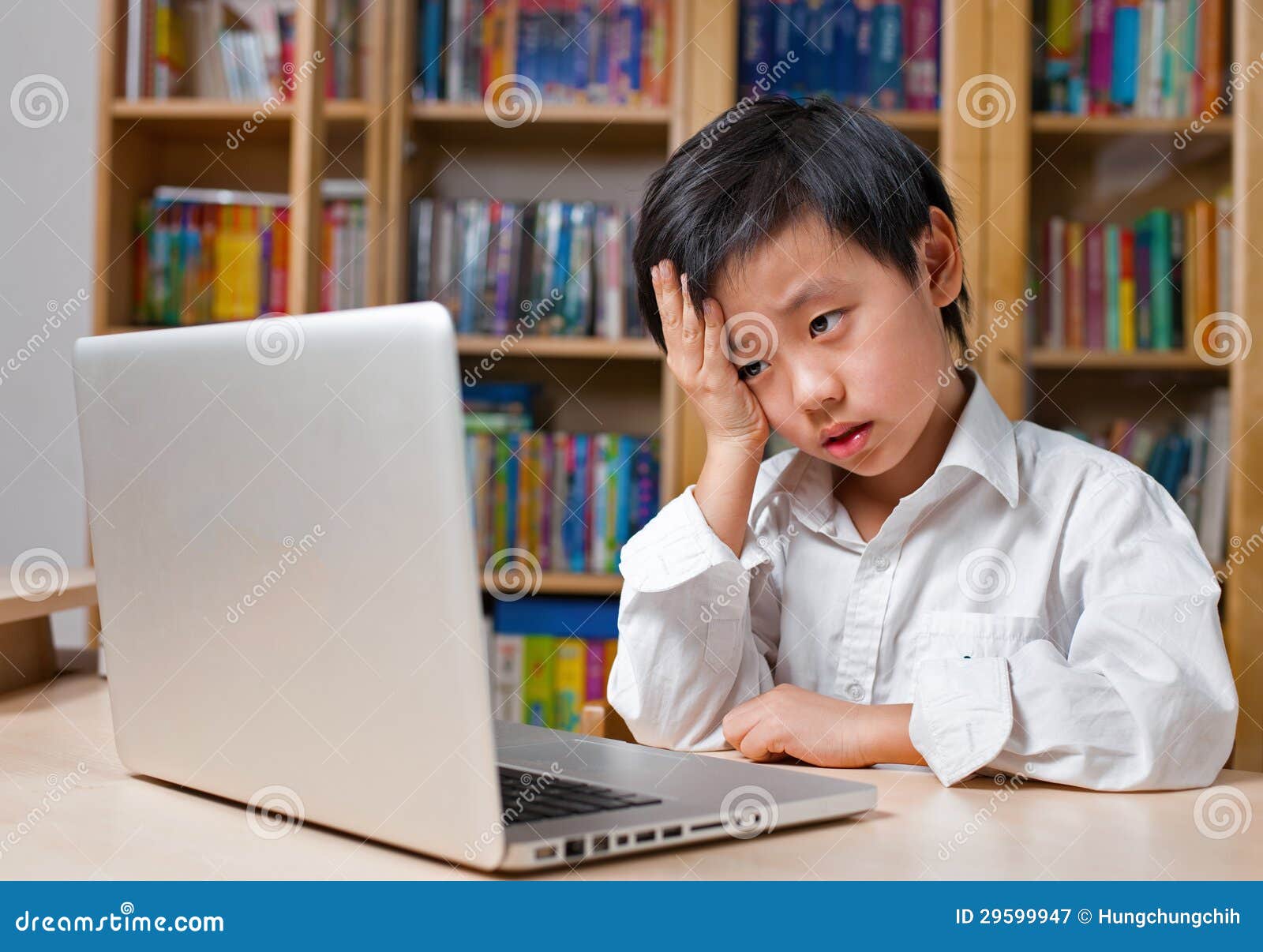 Frustrated Boy in White Shirt in Front of Laptop Computer Stock Image ...